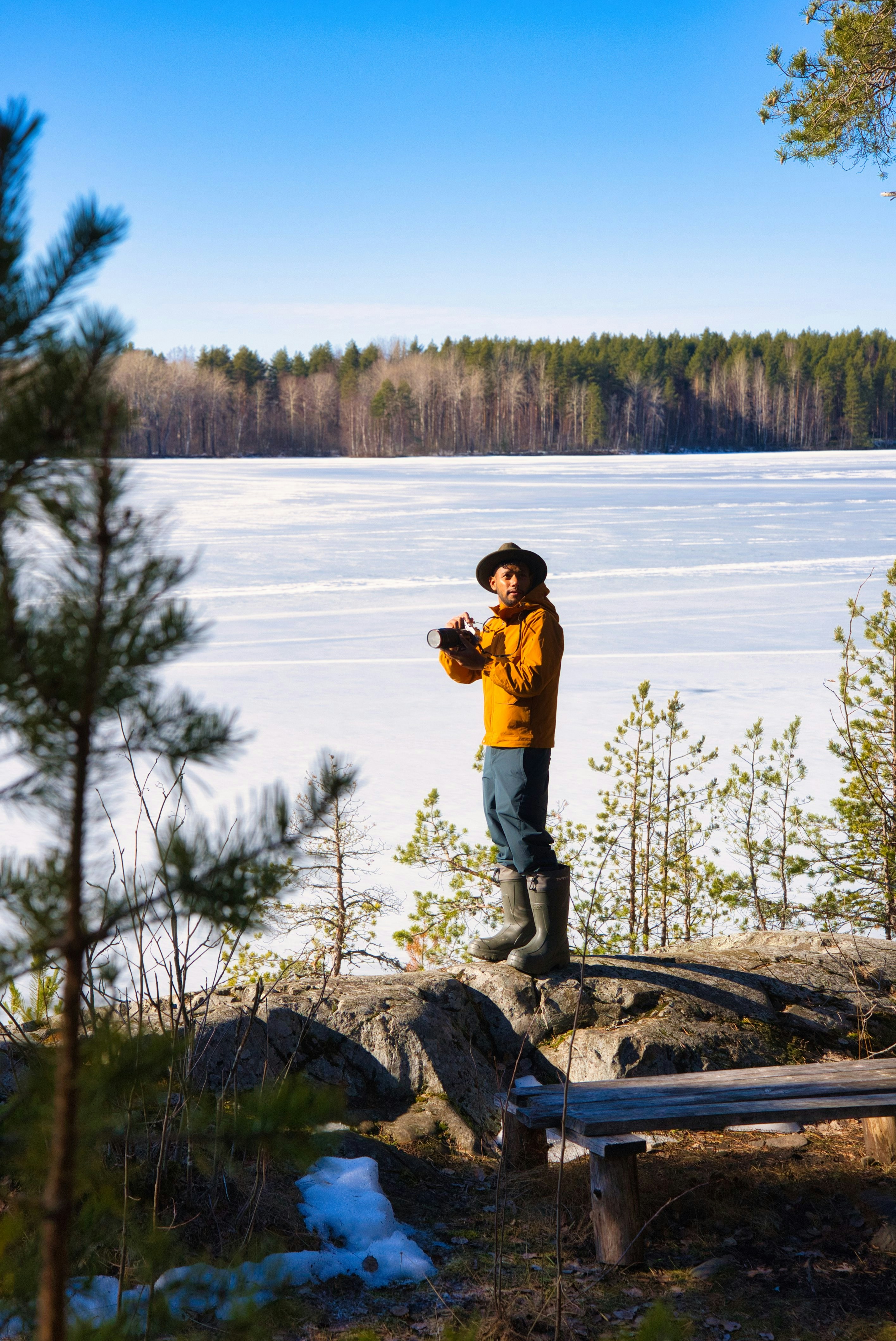Winter Lens: The Snowbound Photographer on the Cliff