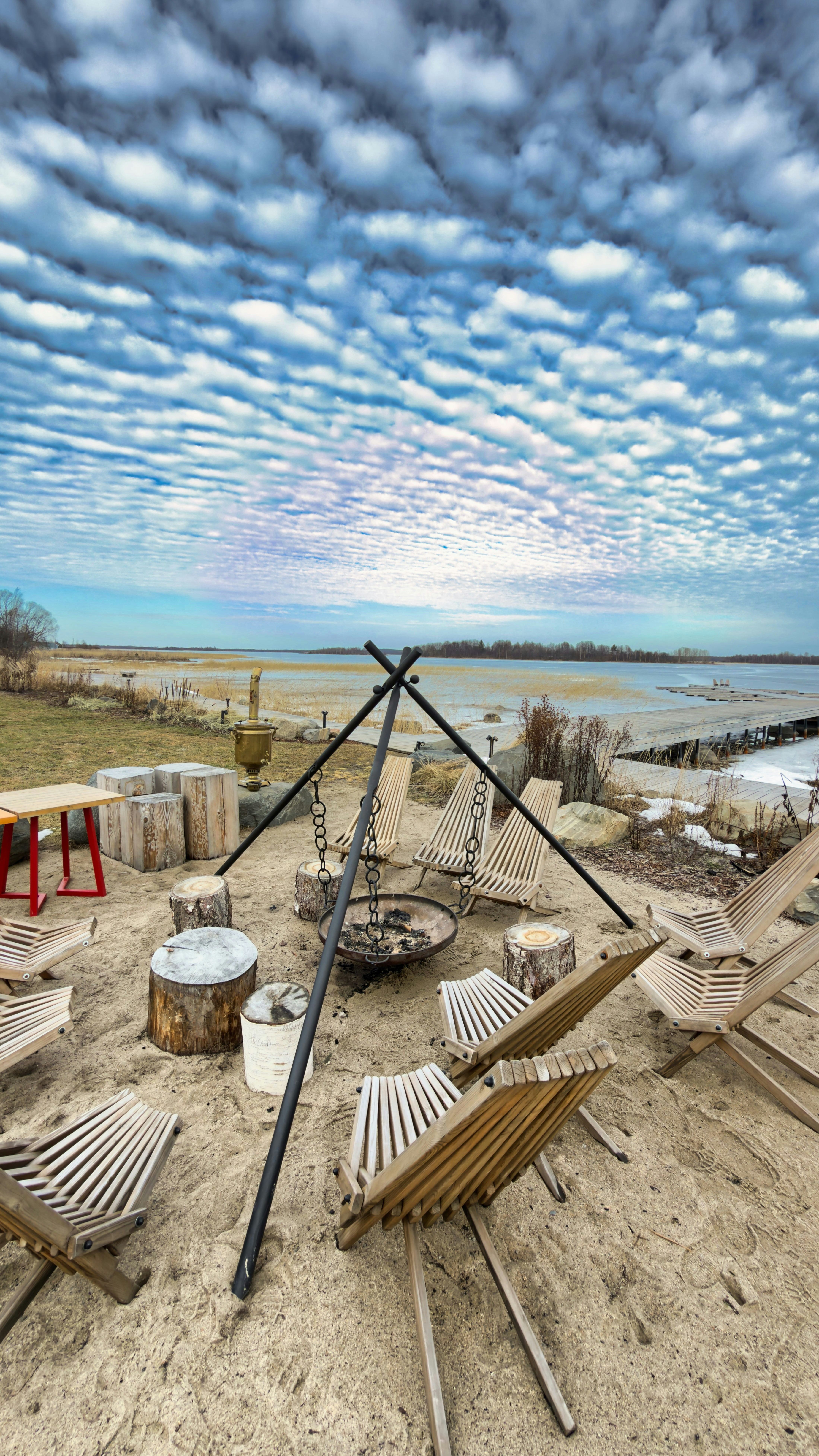 Outdoor Fire Circle under a Serpentine Cloudscape