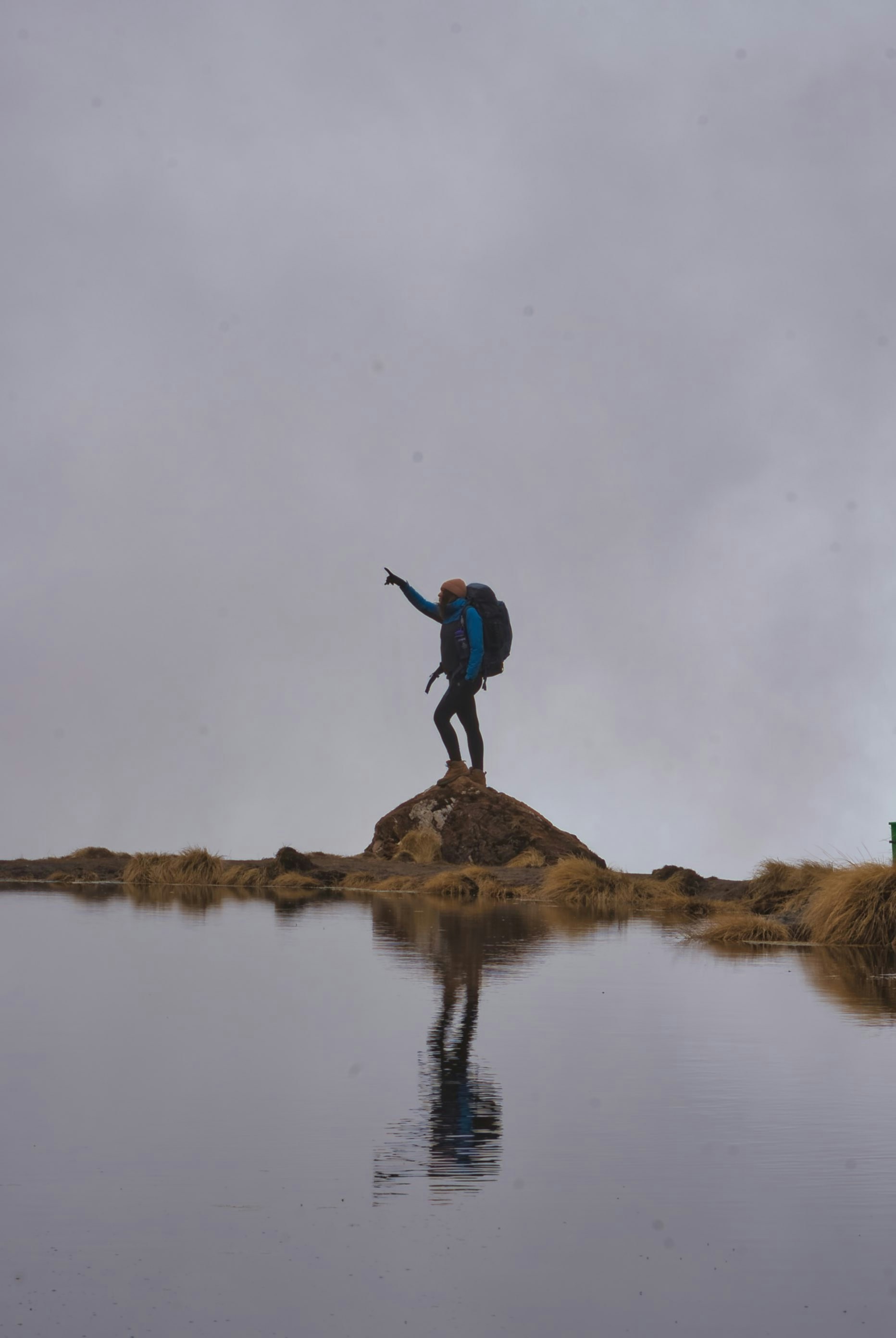 Ridgecrest Beacon: A Hiker Salutes the Sky from a Lone Rock