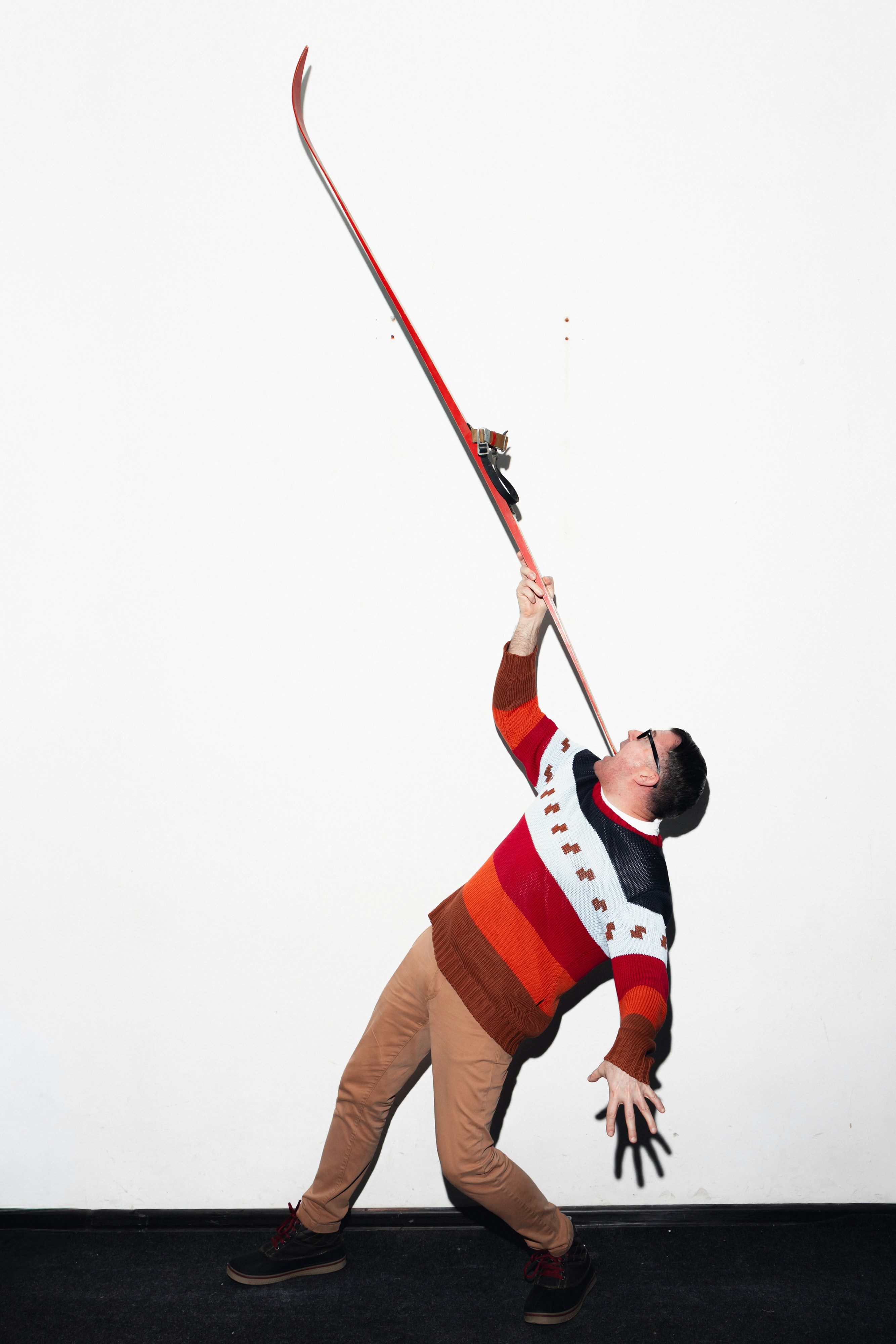Pole-vault of Color: A Skier Reaches for the Peak