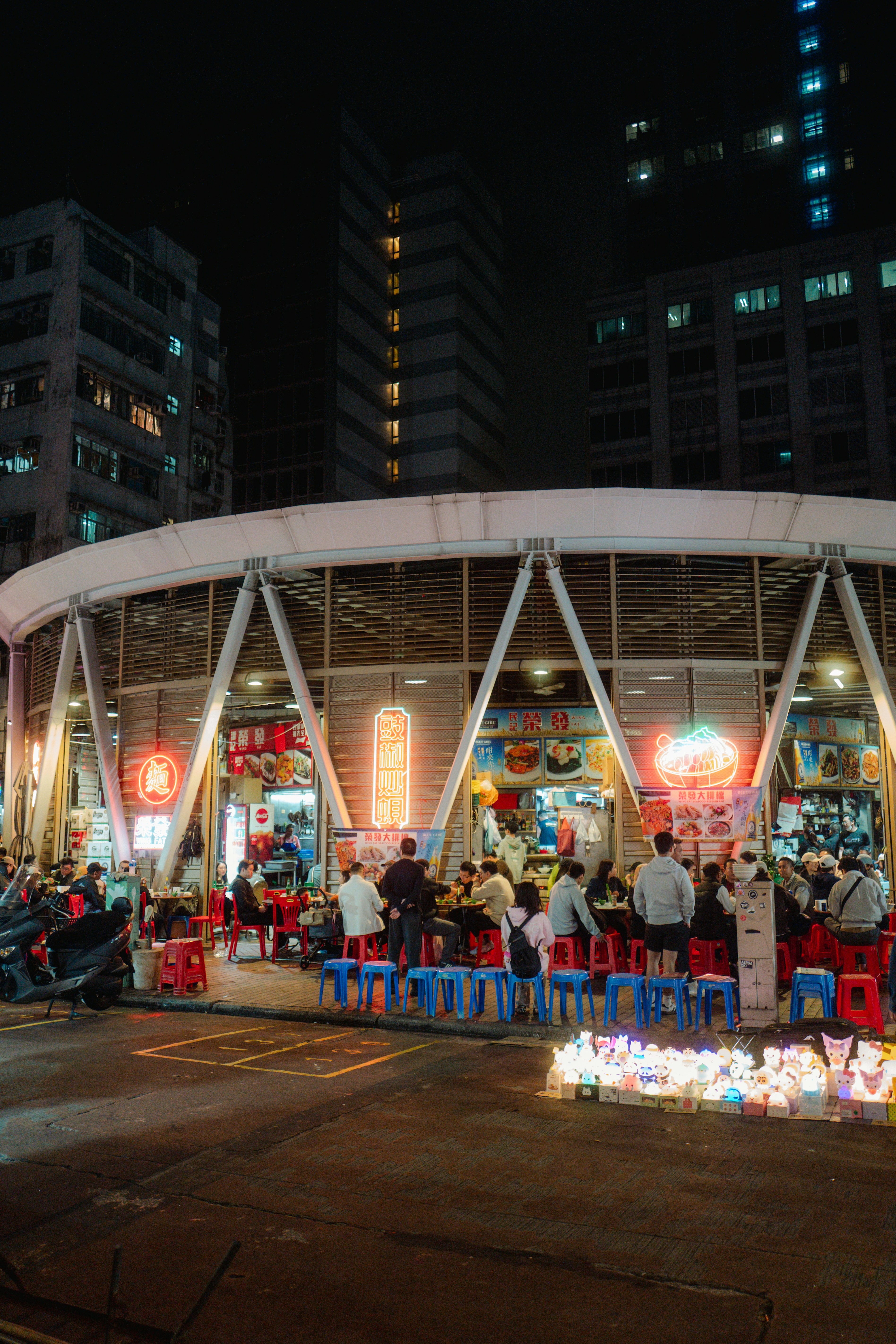 Night Market Canopy: Neon Glow Over Open Seating