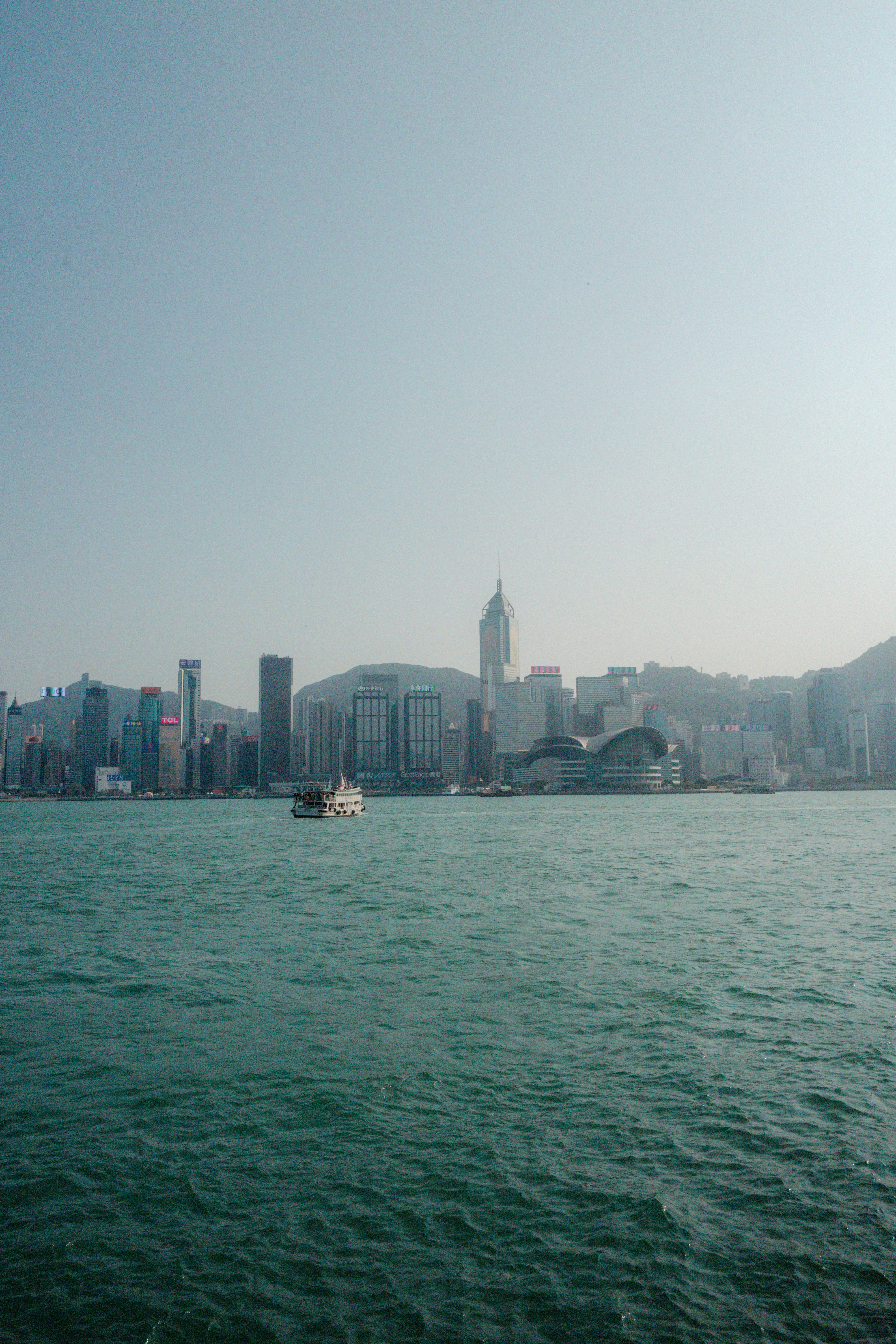 Harbor Horizon: City Silhouette Across Quiet Tide