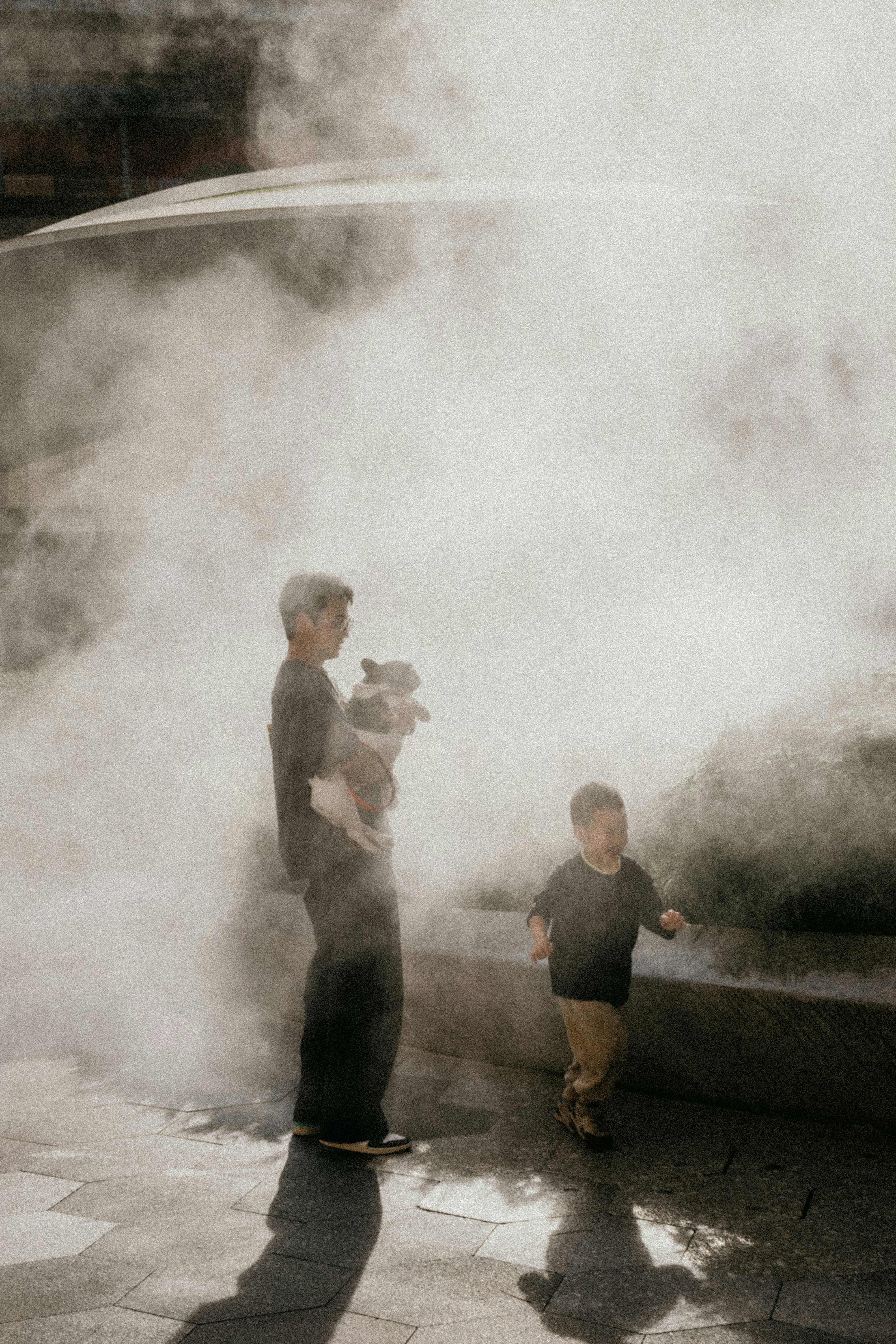 Smoke and Silence: A Quiet Moment with Family Amid Steam
