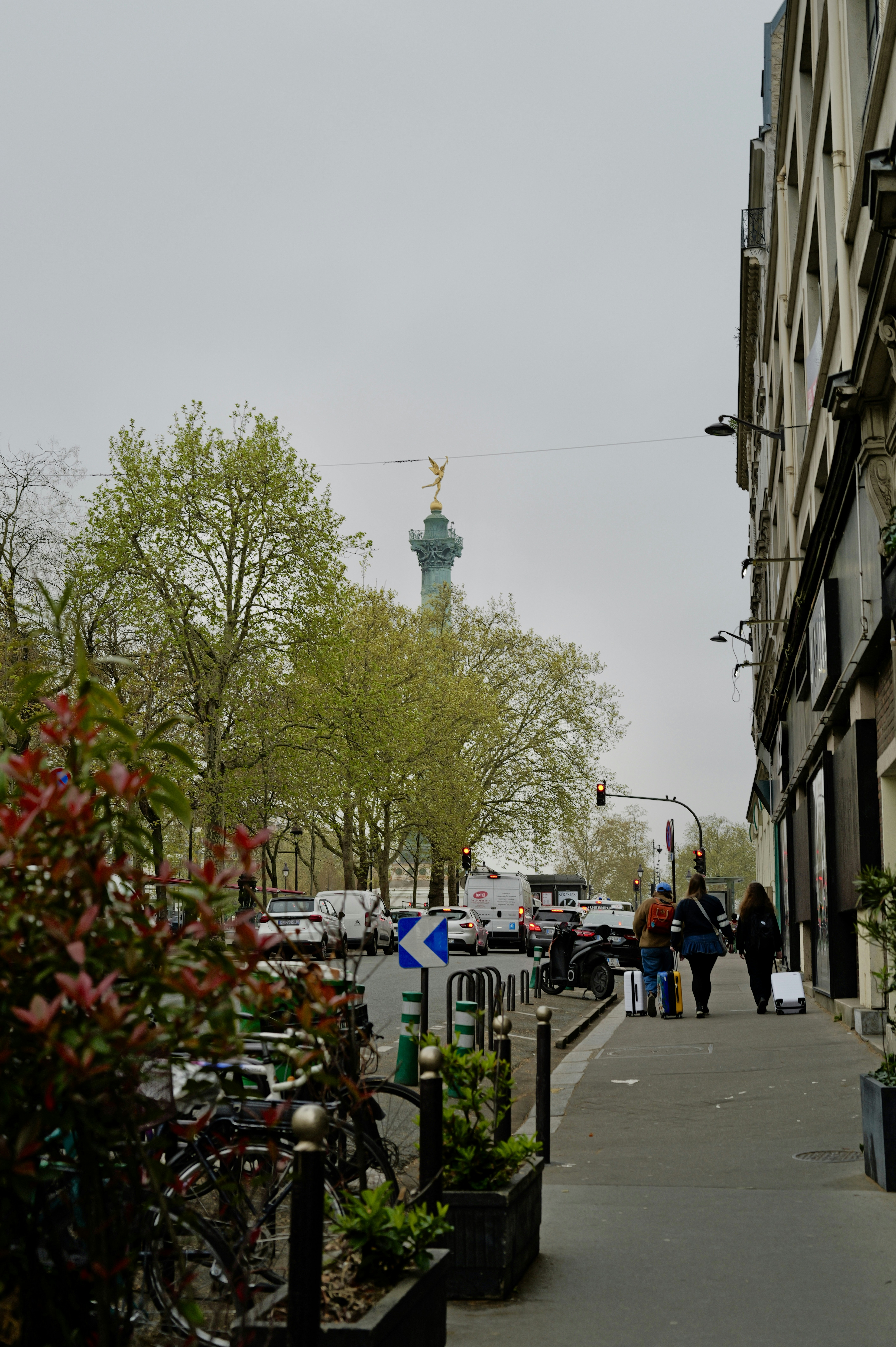 Streetway to the Monument: Parisian Avenue with a Spire in the Distance
