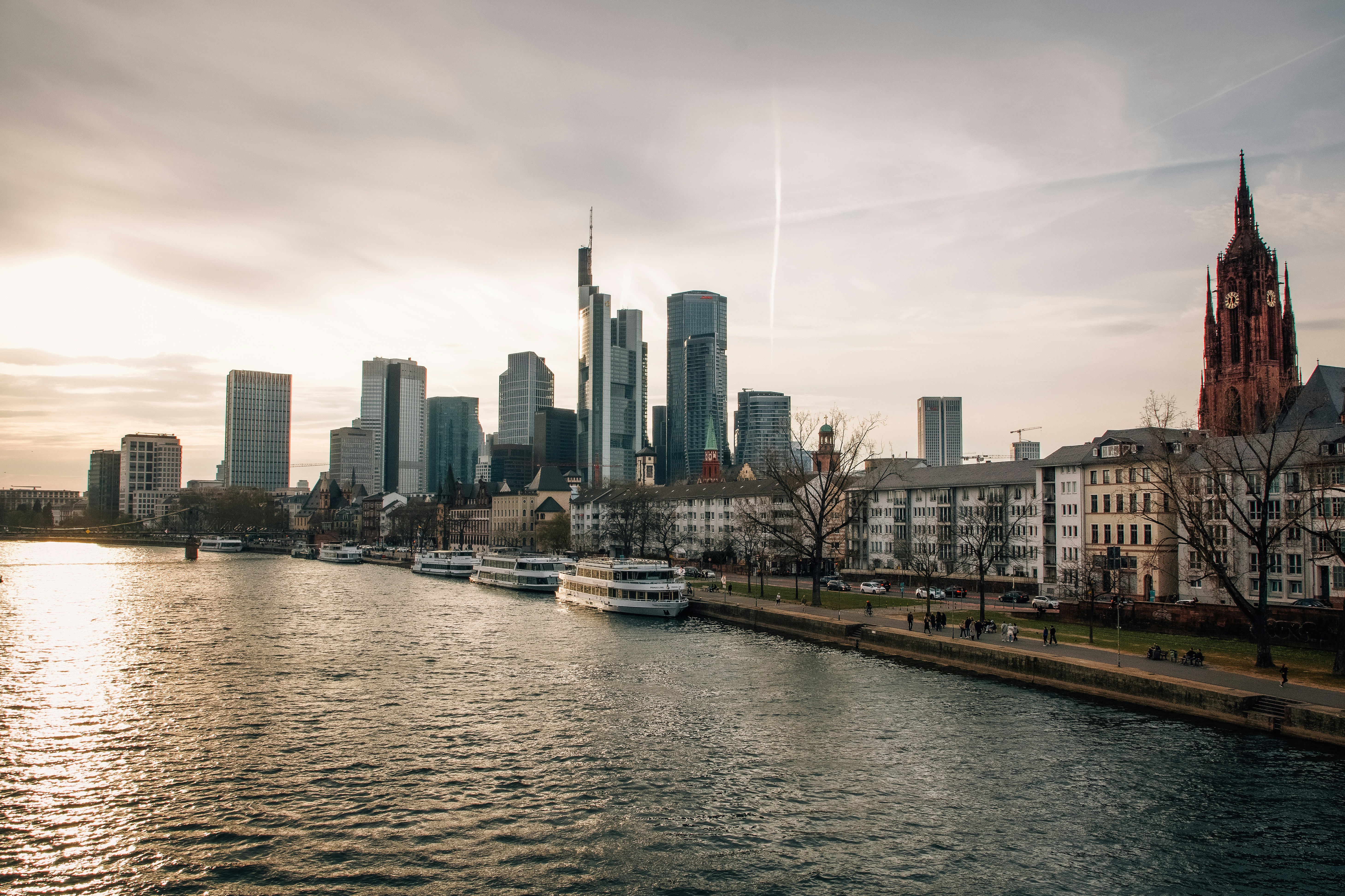 Urban Reflections: A Riverside Skyline at Dusk