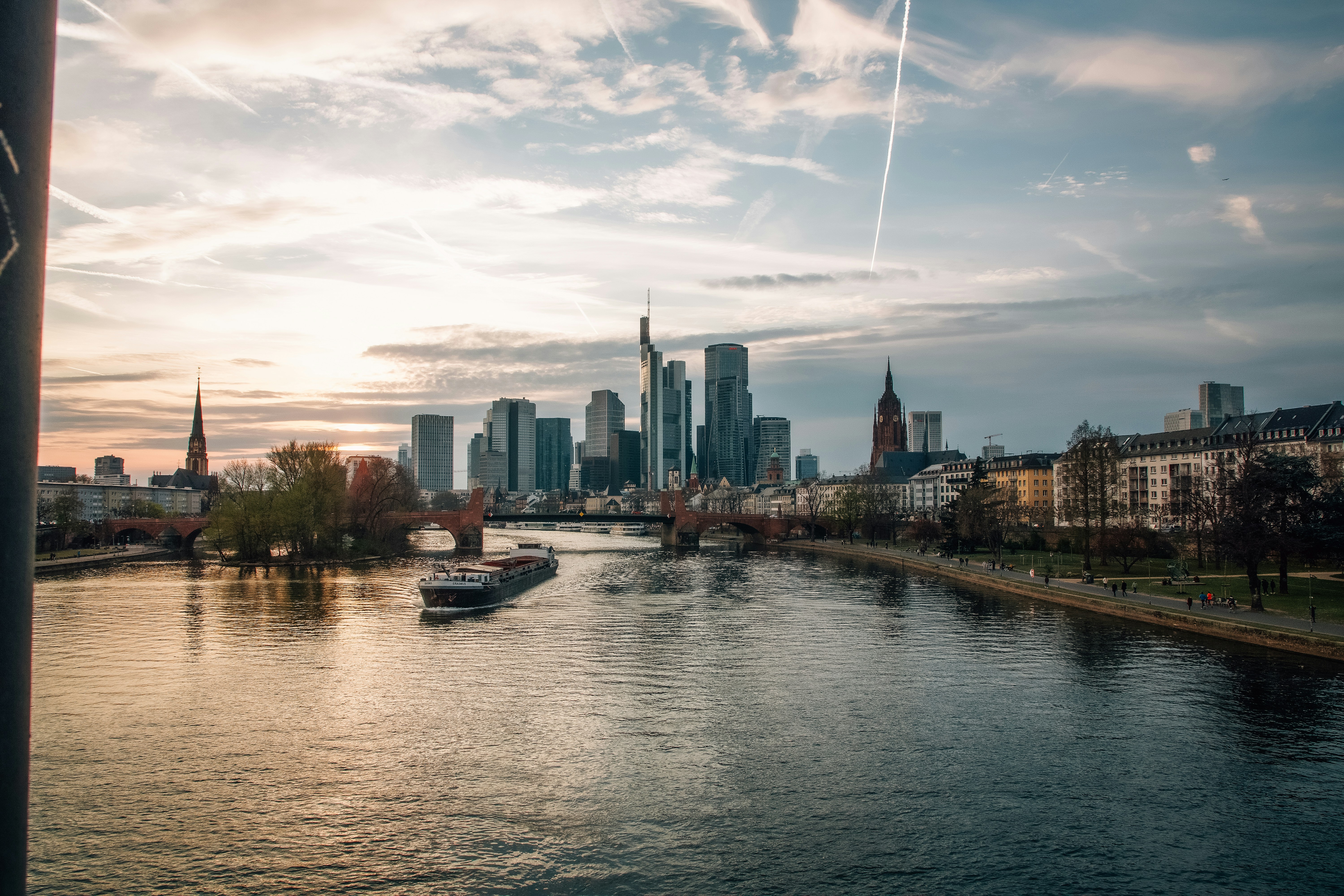 Sunset over the River City: A Modern Skyline Framed by Water and Light