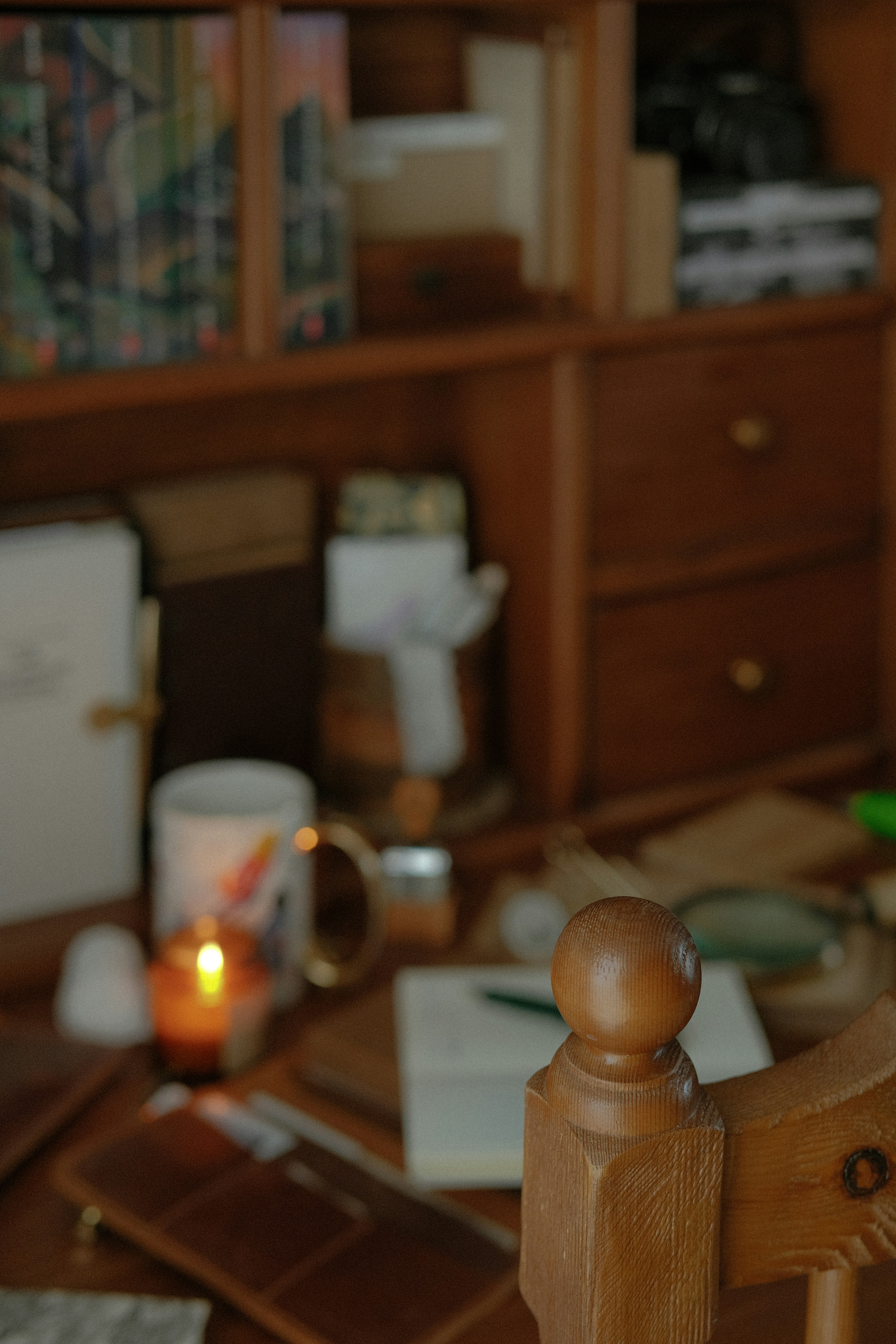 The Wooden Finial: A Quiet Desk in Warm Light