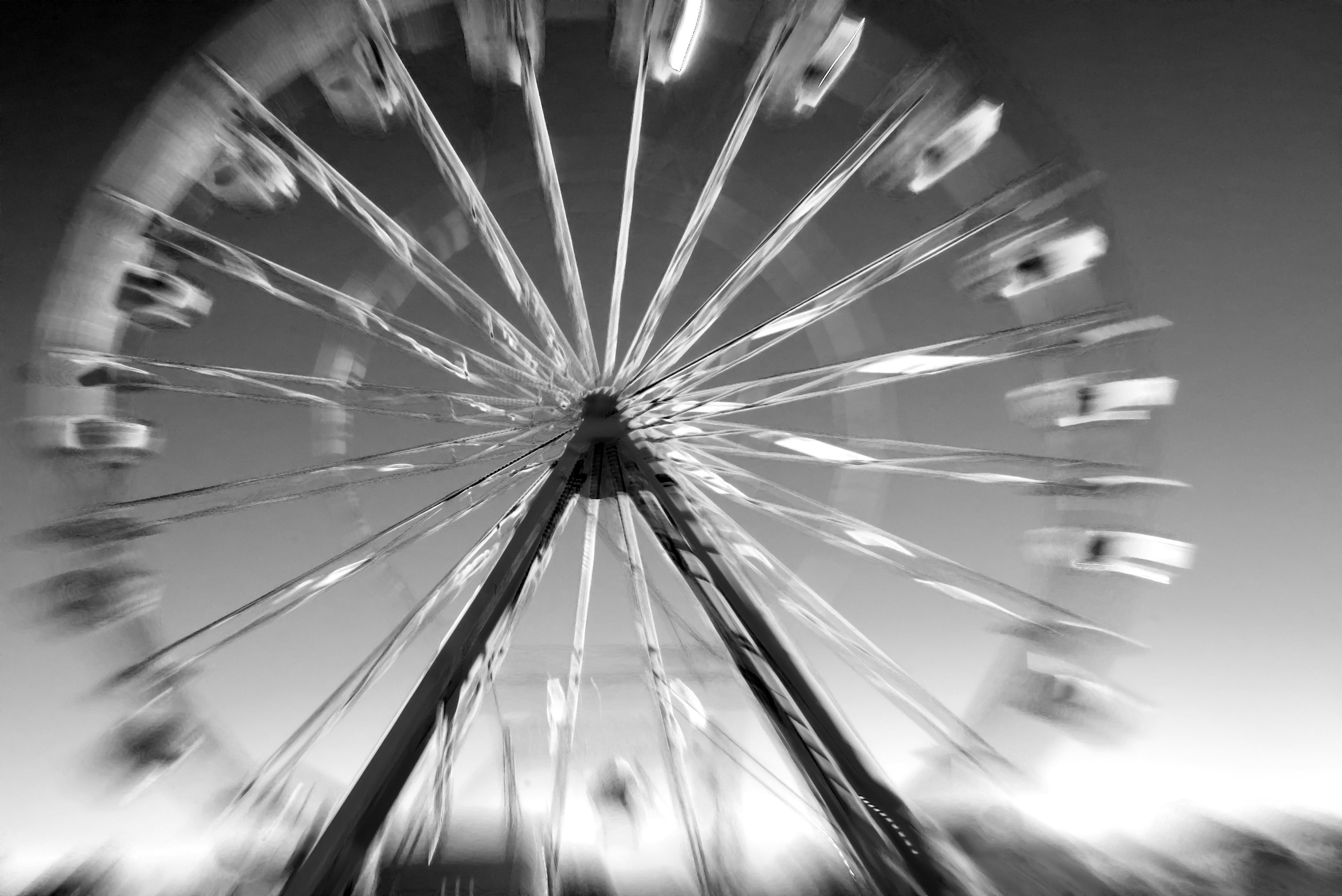 Blurred Ferris Wheel Ring: A Nighttime Spin in Soft Focus