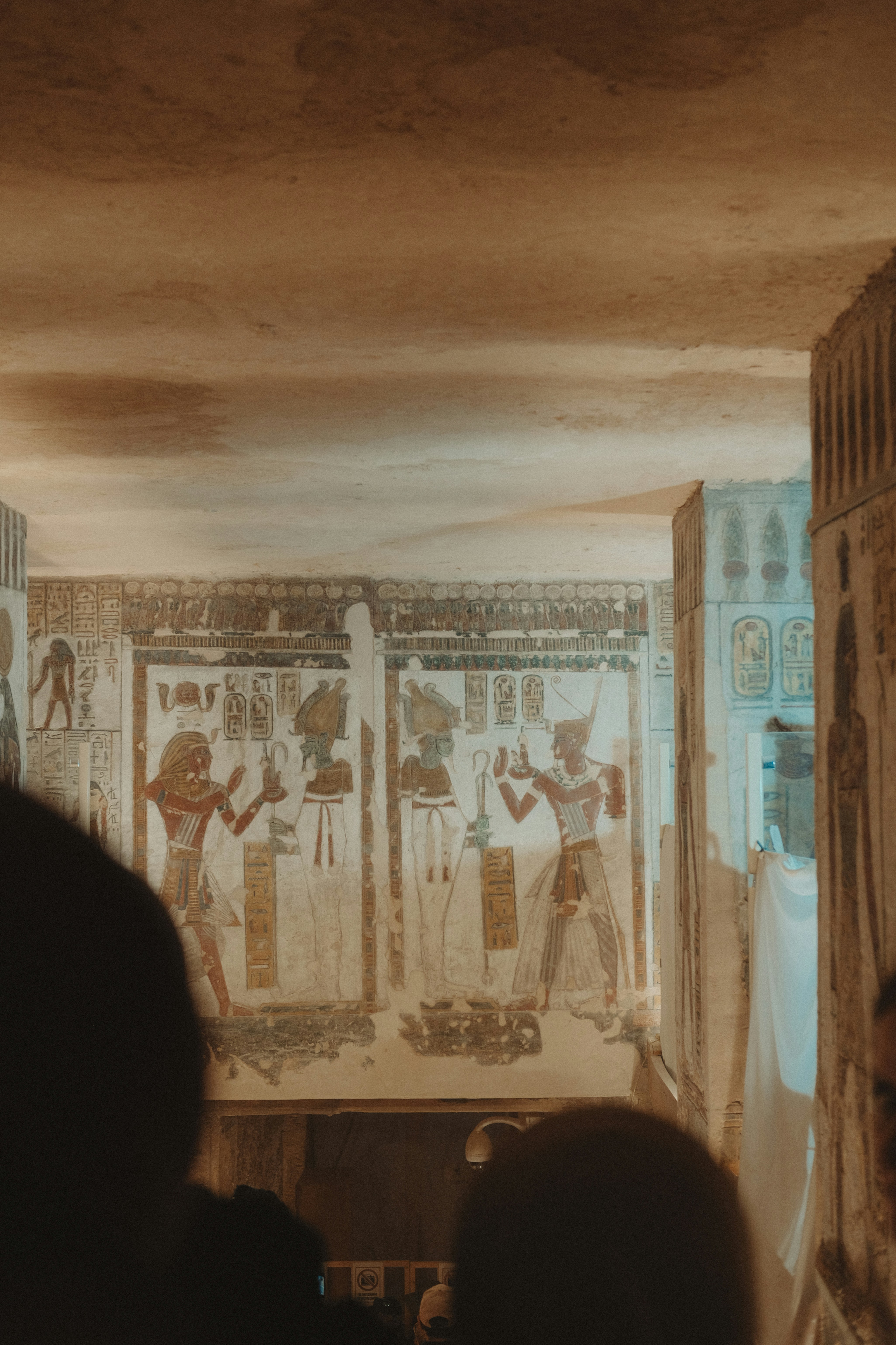 Echoes of the Painted Hall: Ancient Reliefs in a Dim Gallery