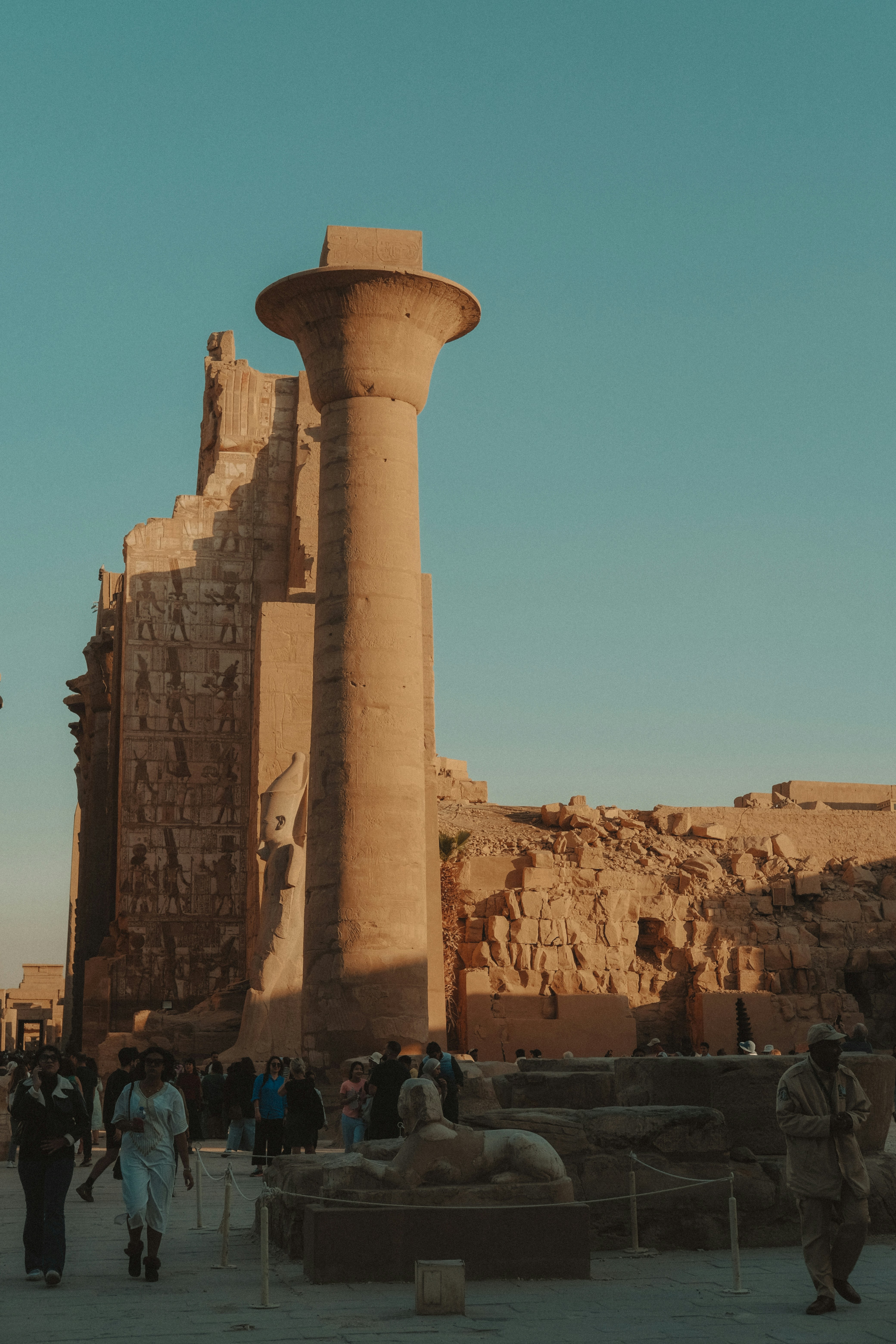 Columned Silence: Sunlit Ruins Under Desert Sky