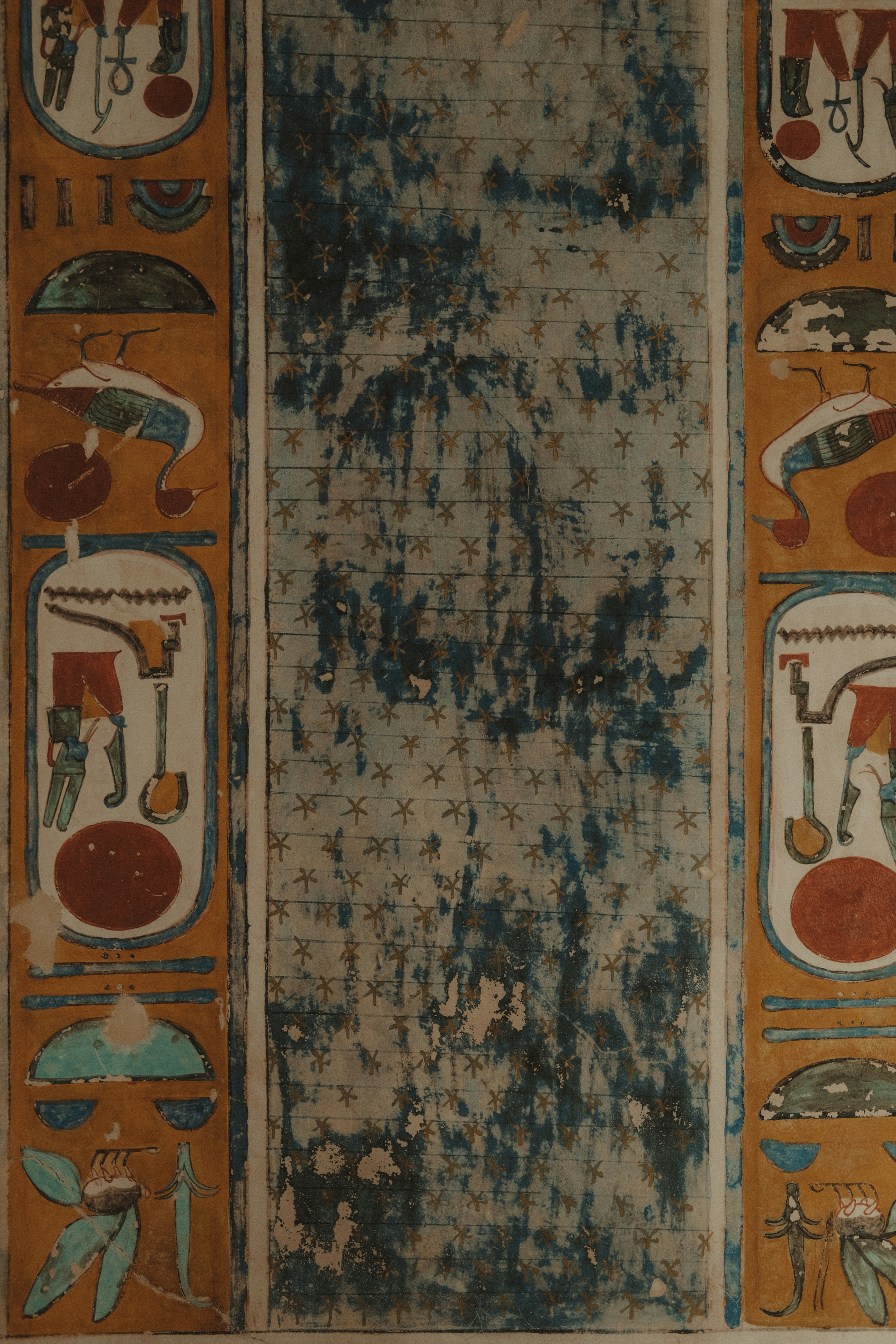 Fragmented Fresco: Eroded Central Panel Between Decorated Borders