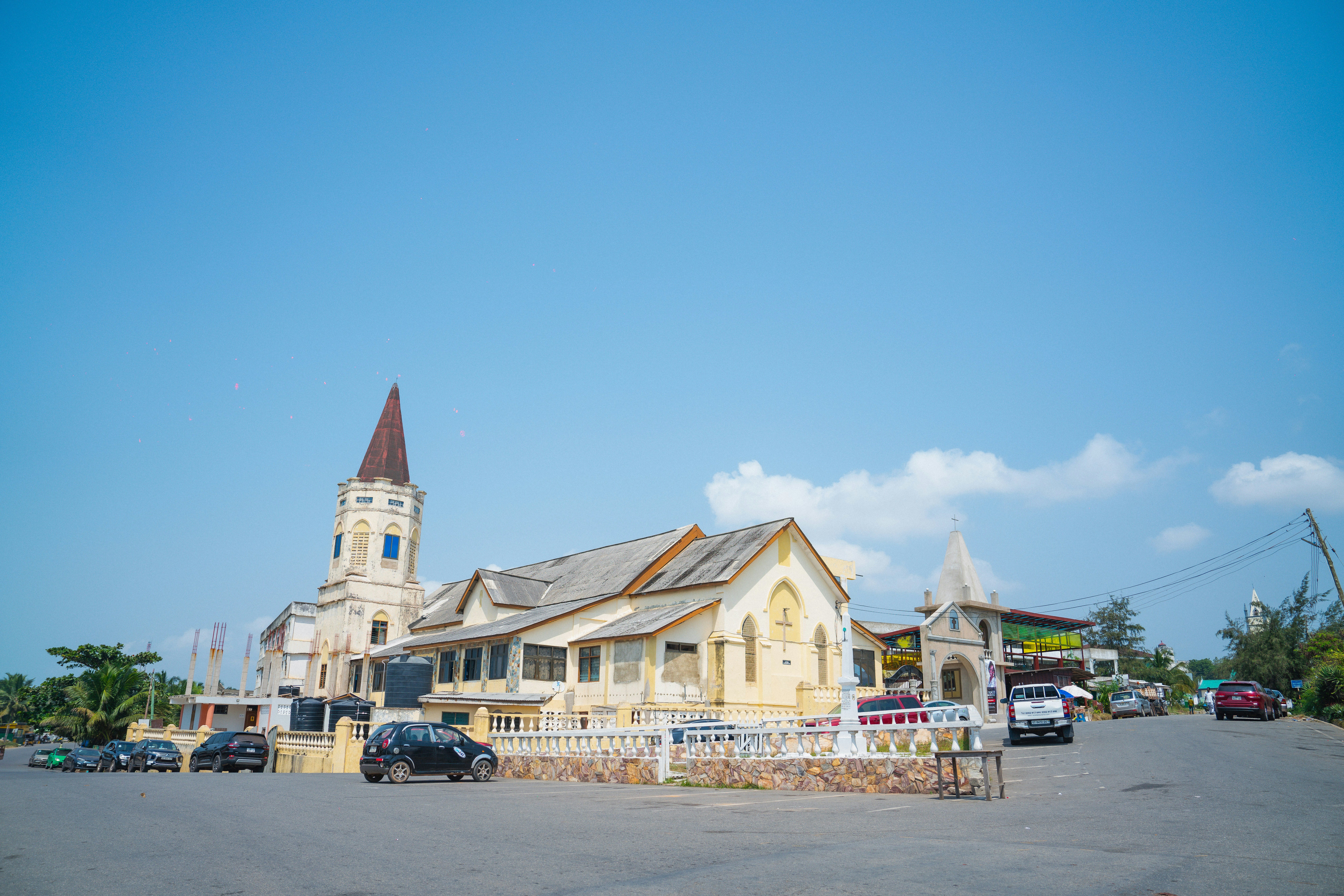 Sunny Coastline Basilica: A Low-Angle View of a Historic Campus Building