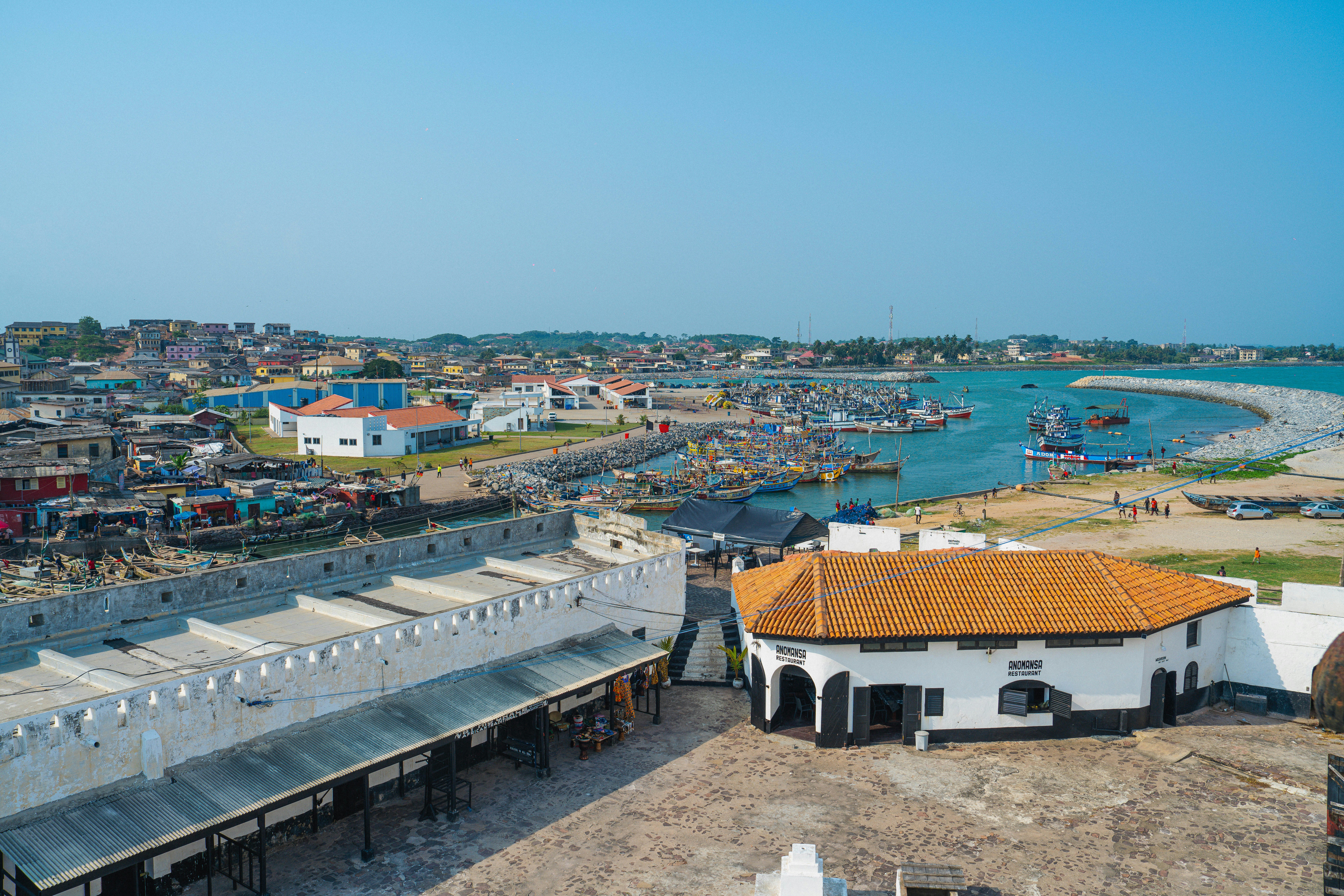 Harborline: A coastal market town under clear blue skies