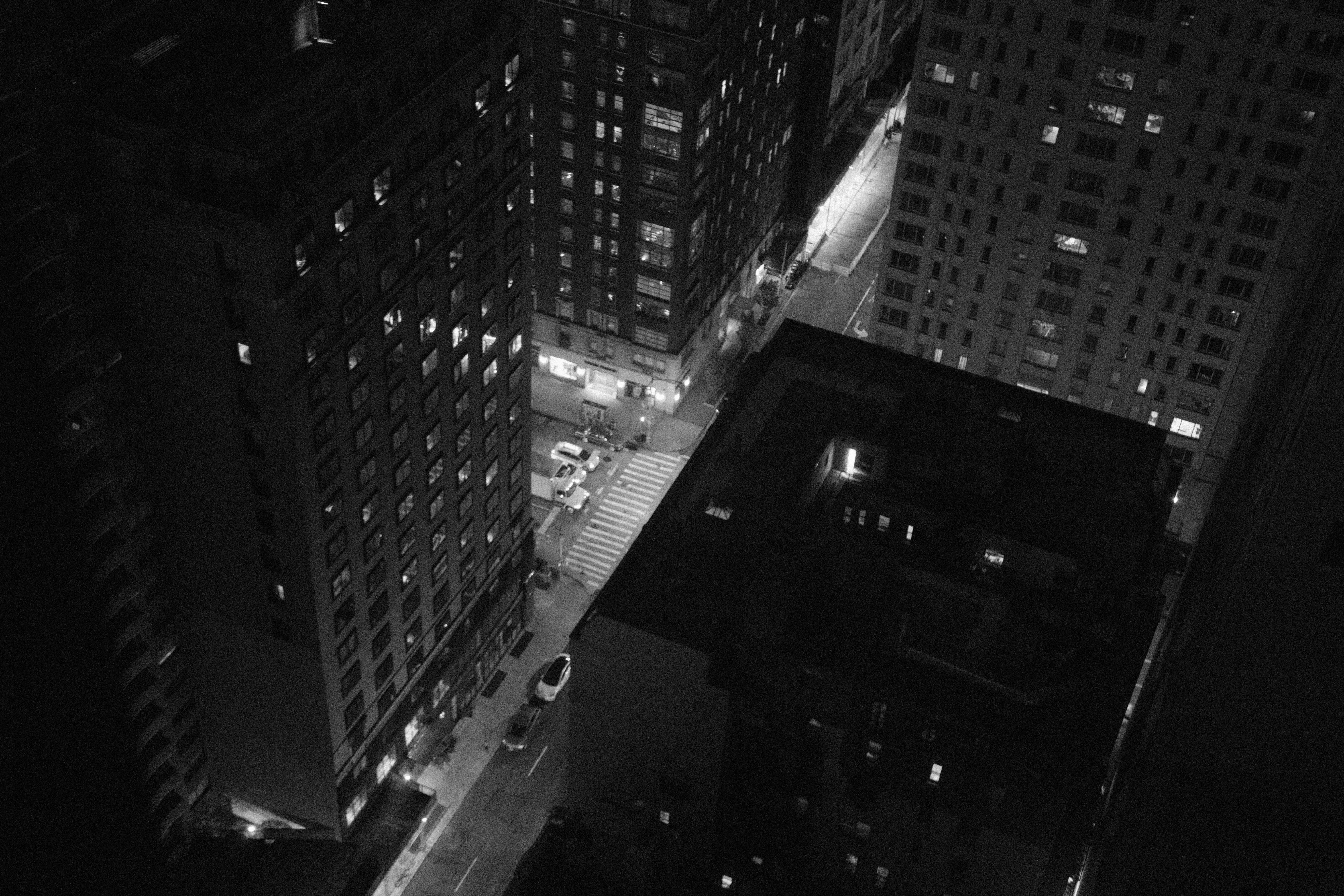 Midnight City: A Quiet Avenue Between Skyscrapers