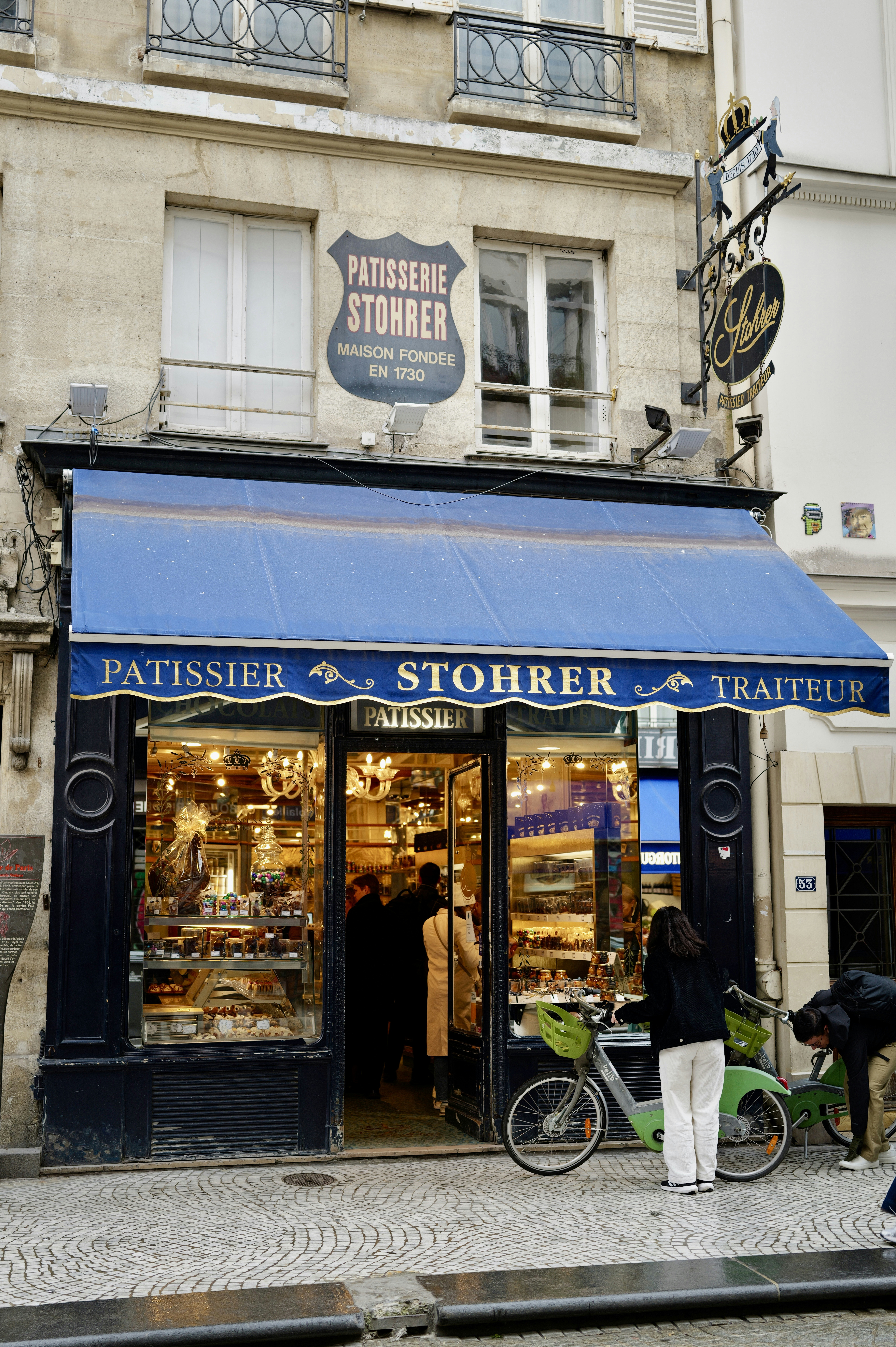 Blue Canopy, Warm Lights: Inside a Paris Patisserie