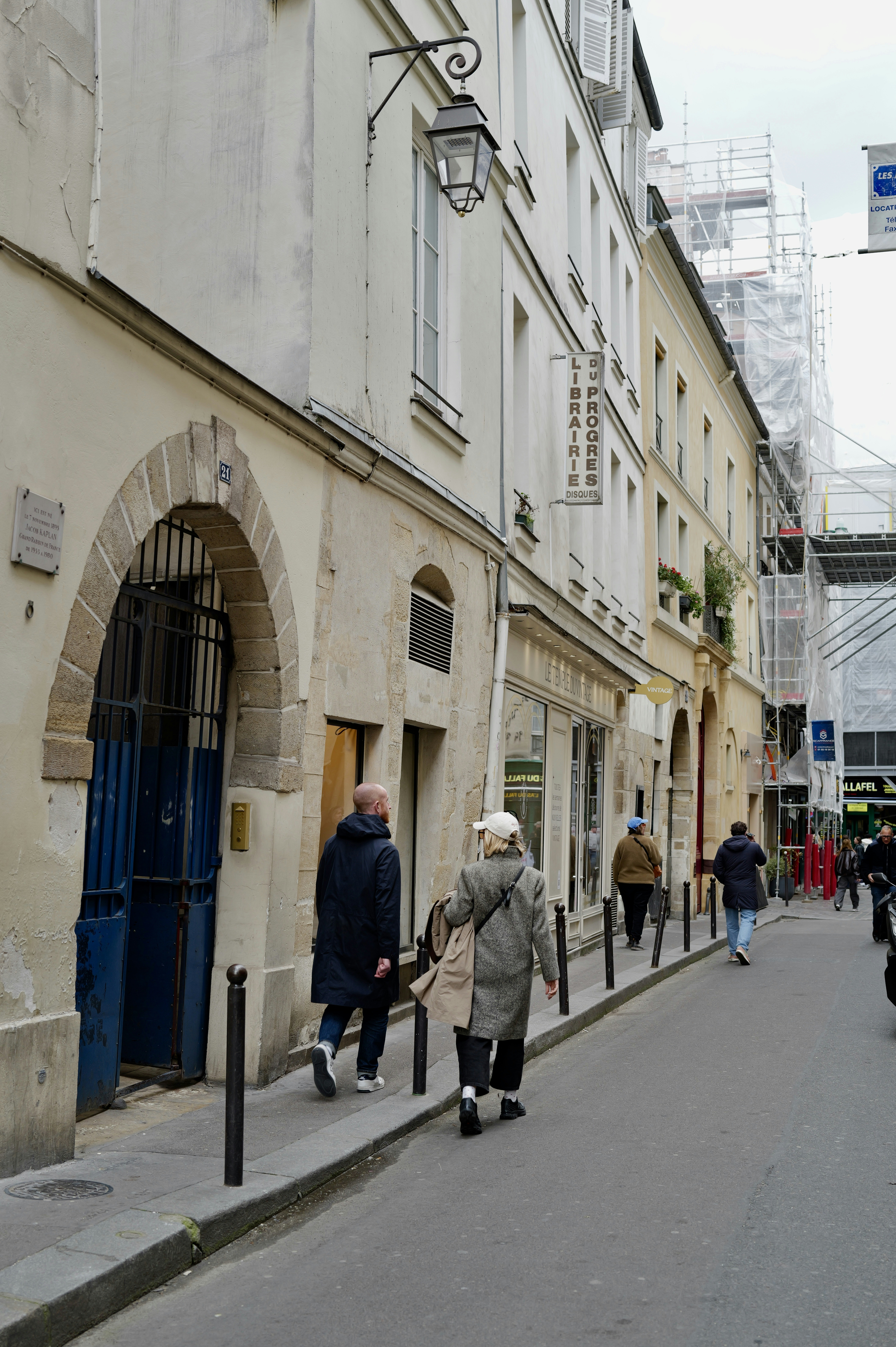 Footsteps Through a Springtime City Corridor