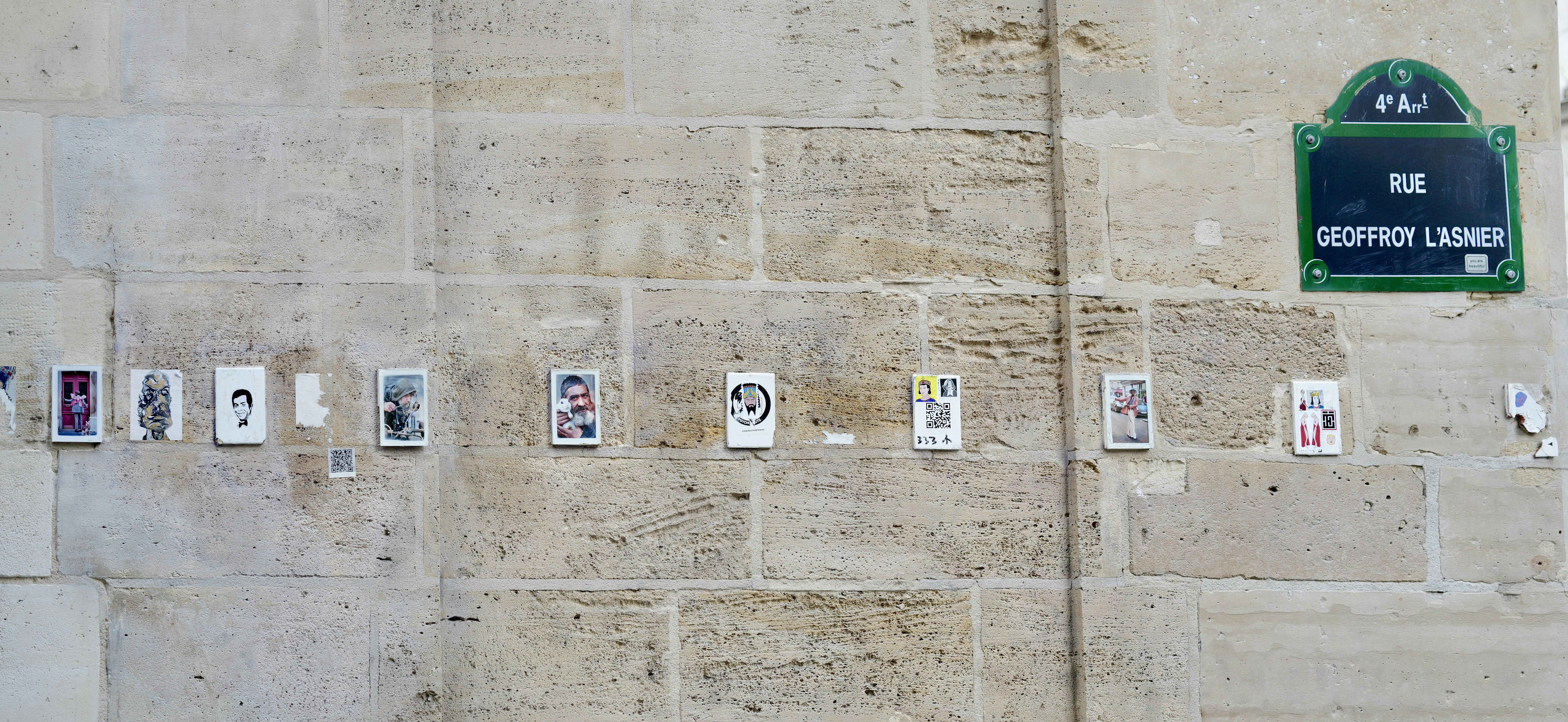 Silent Gallery: Posters on a Weathered Parisian Wall