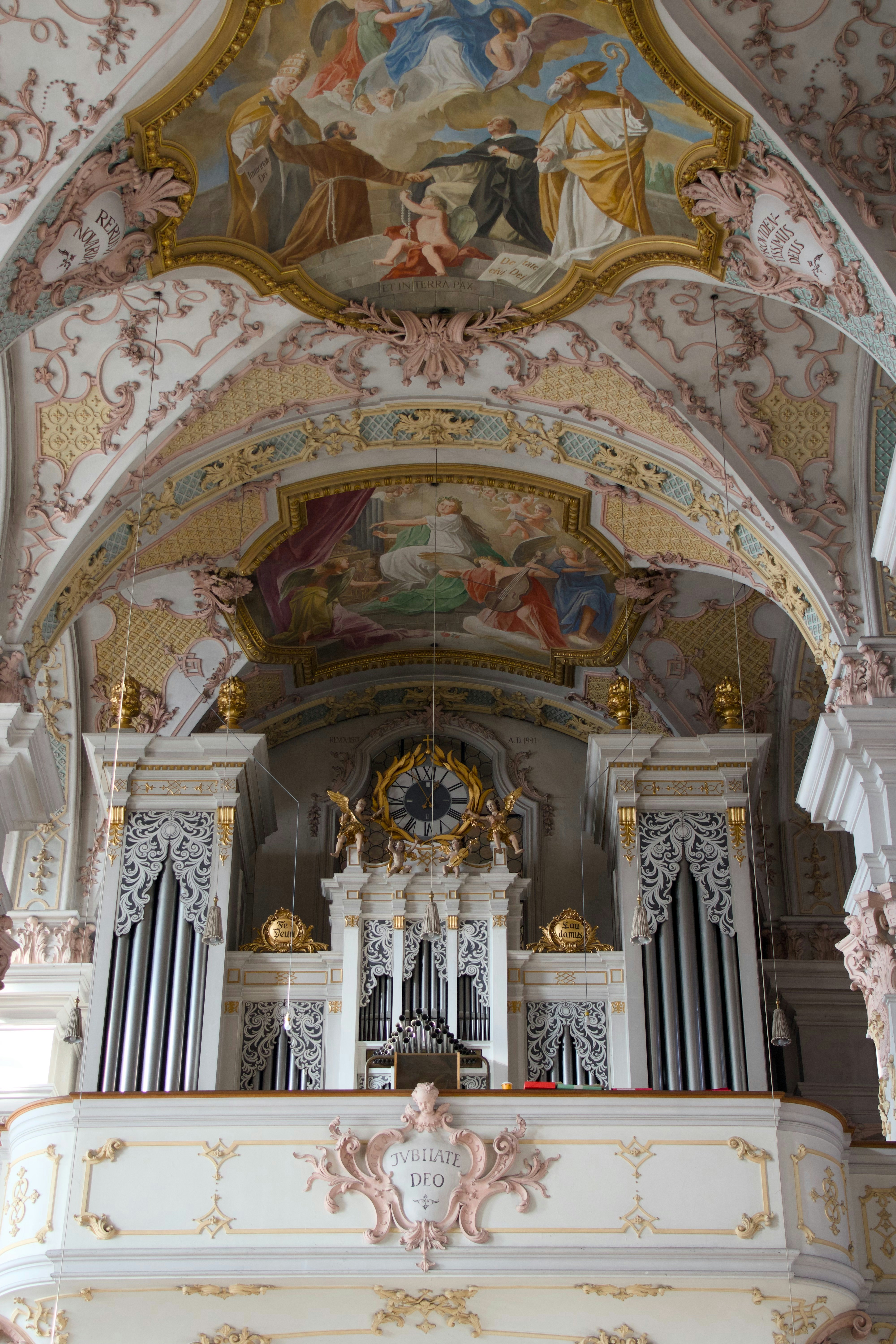 Ornate Organ Loft Beneath Painted Vaults