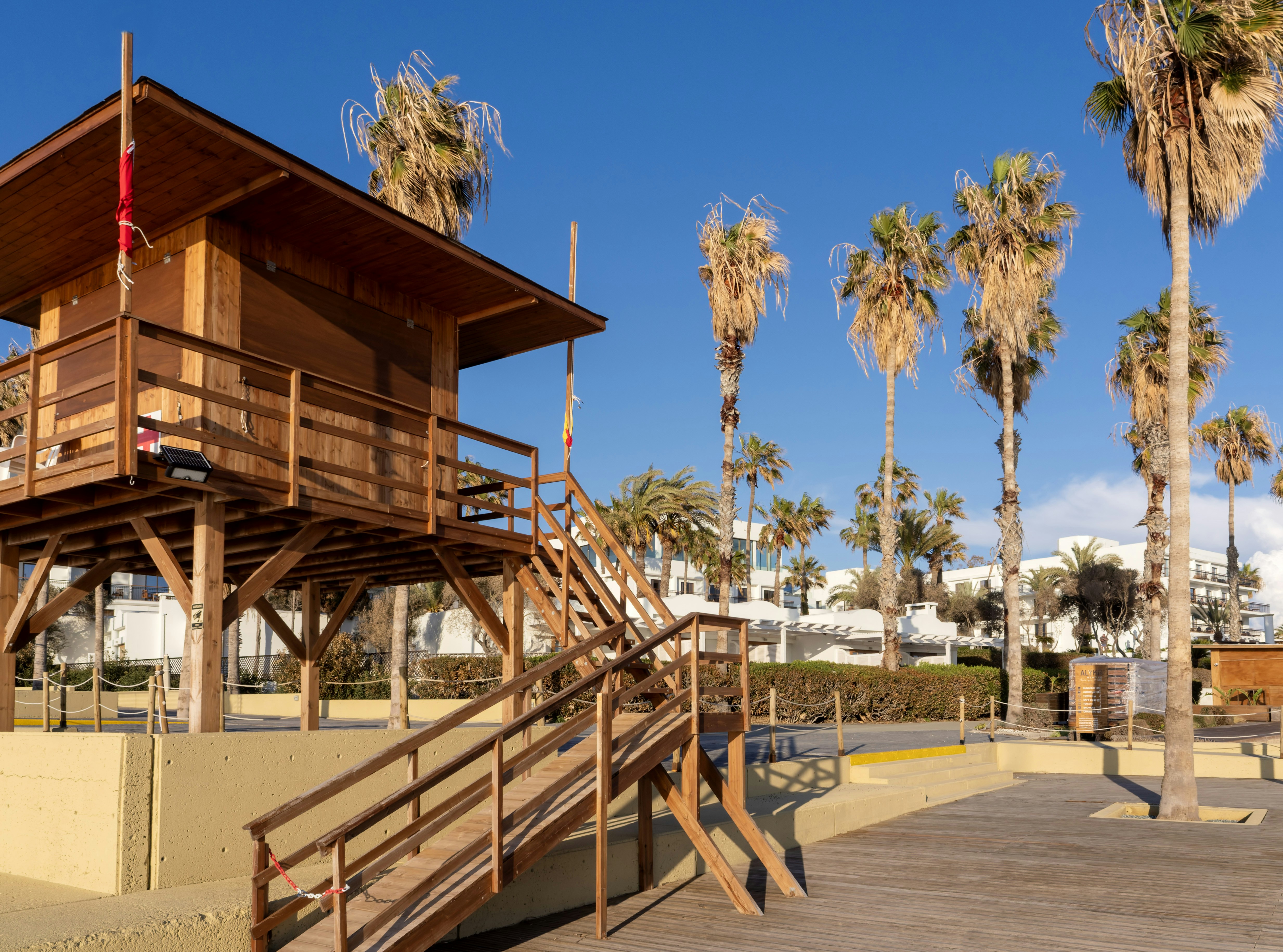 Lifeguard Tower on a Sunny Coastal Boardwalk