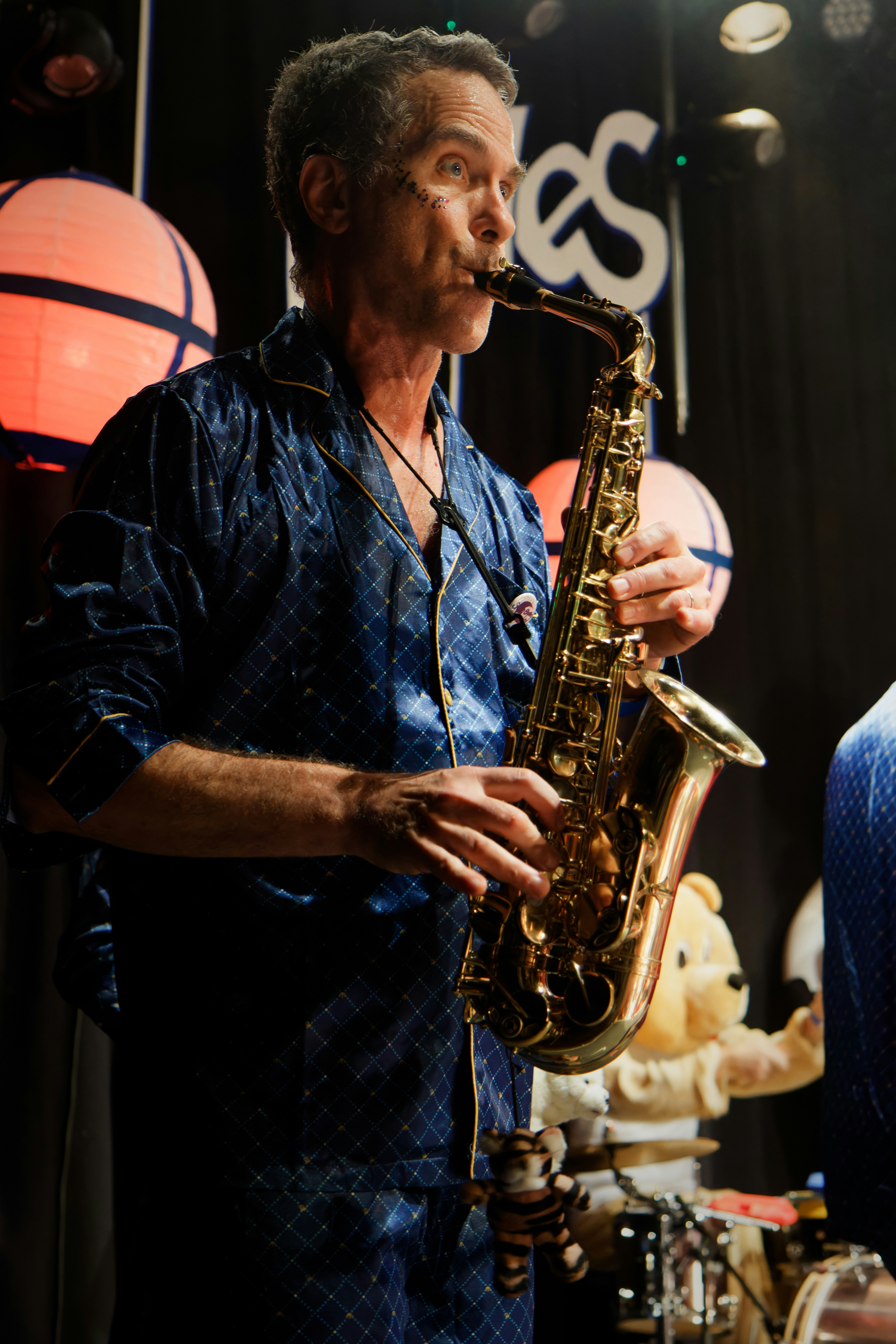 Saxophone Serenade Under Stage Lights