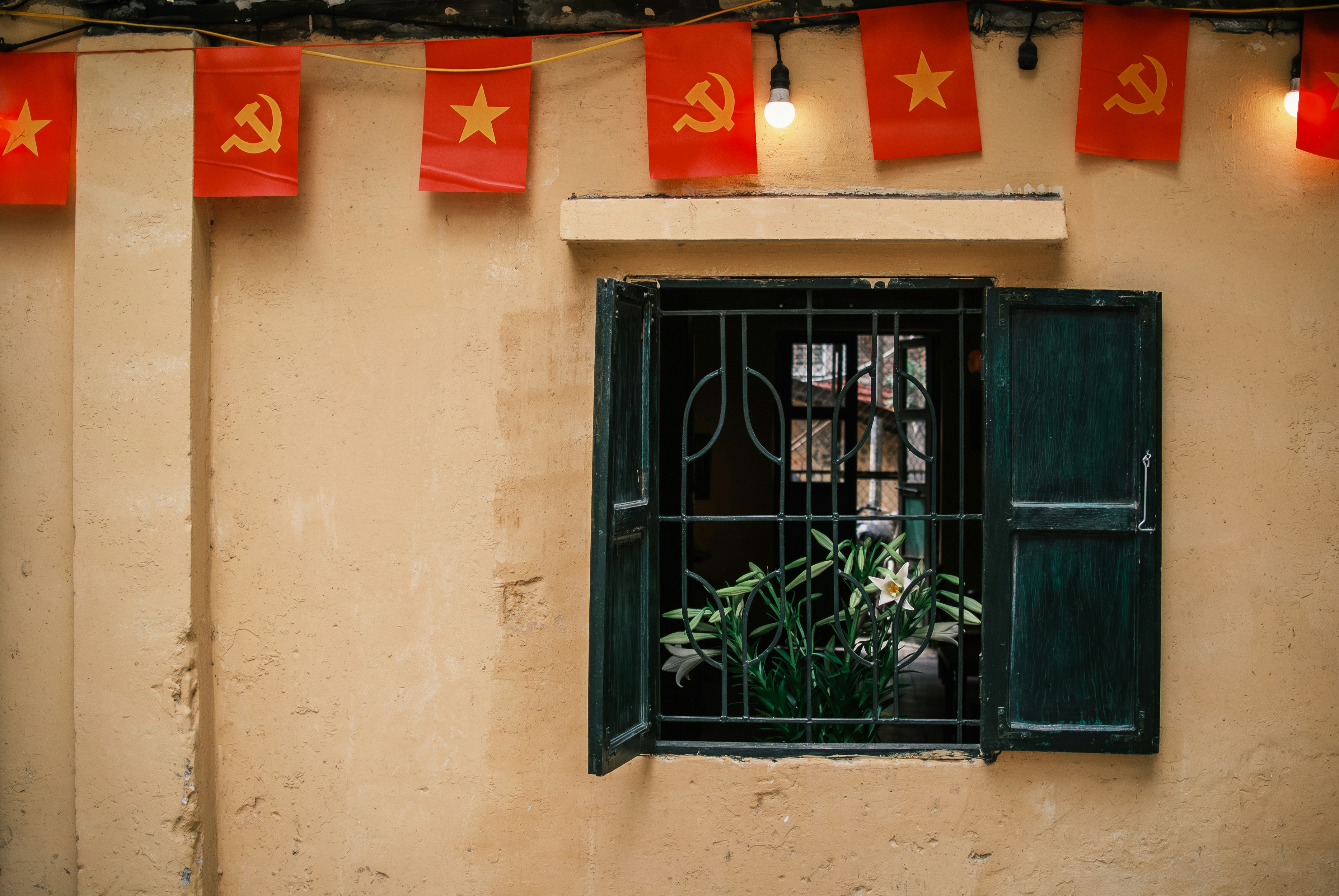 Green Window in a Wall of Flags
