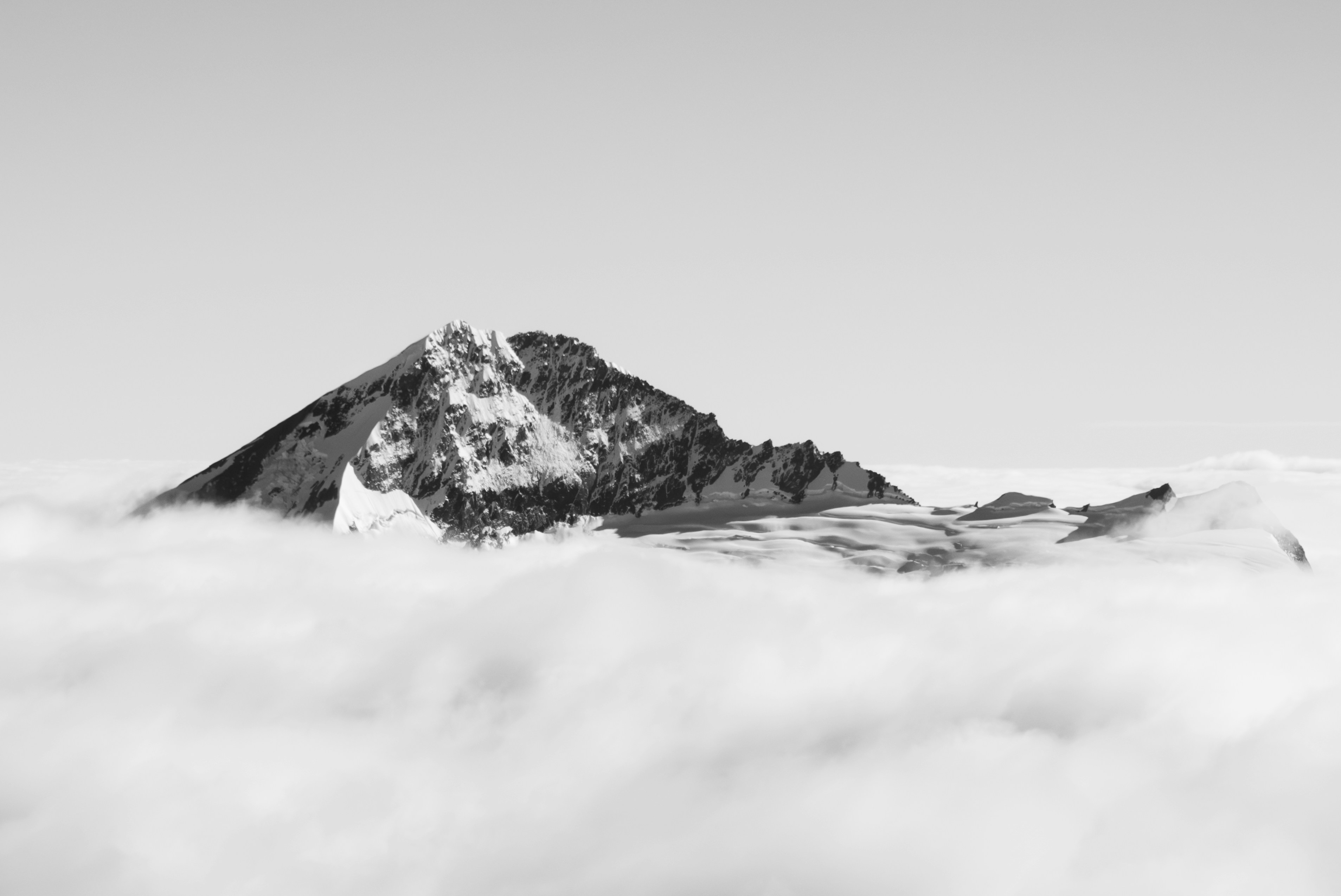 Above the Sea of Clouds: A Lone Alpine Peak Emerges