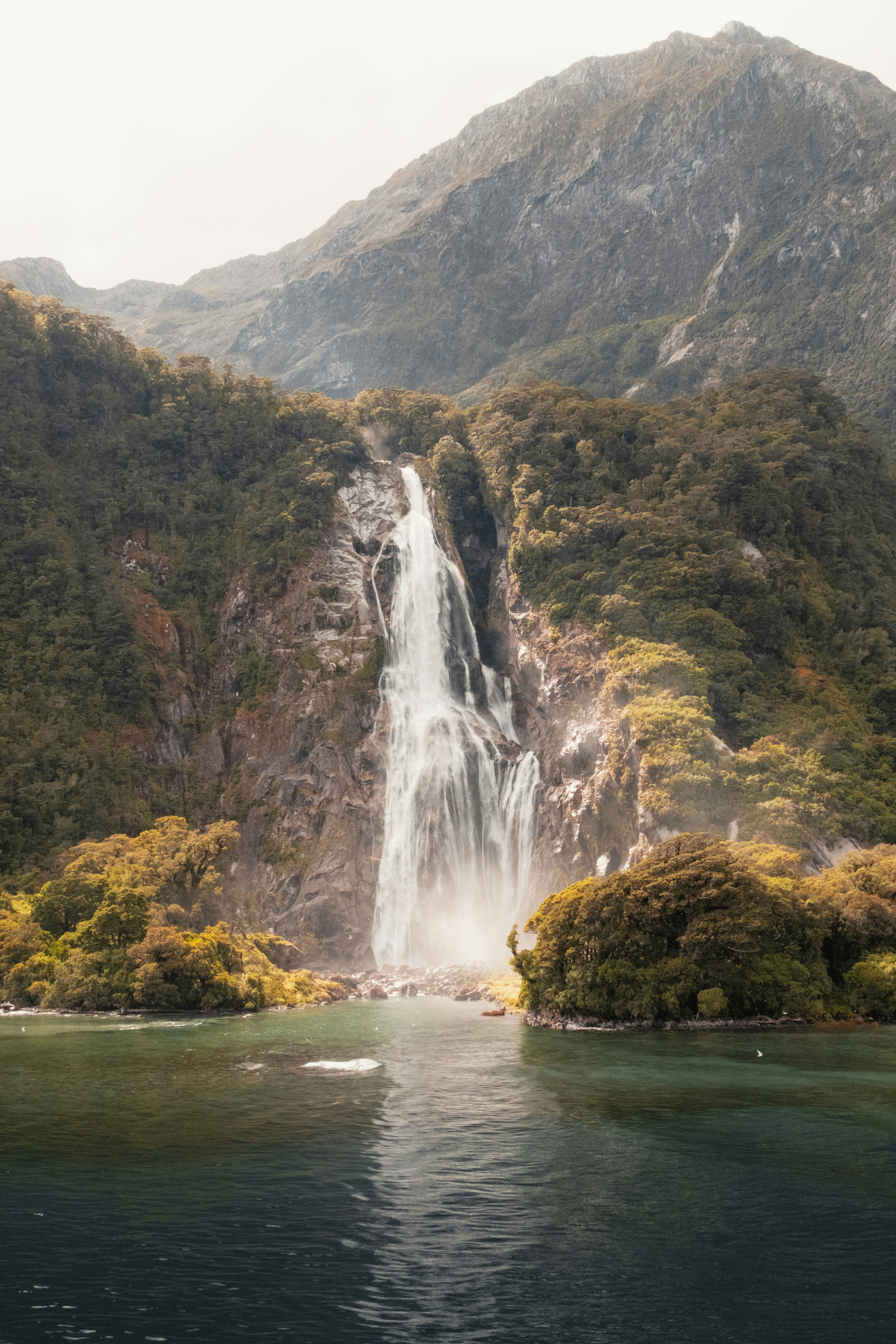 Emerald Vale Falls: A Cascade Between Mountain and Sea