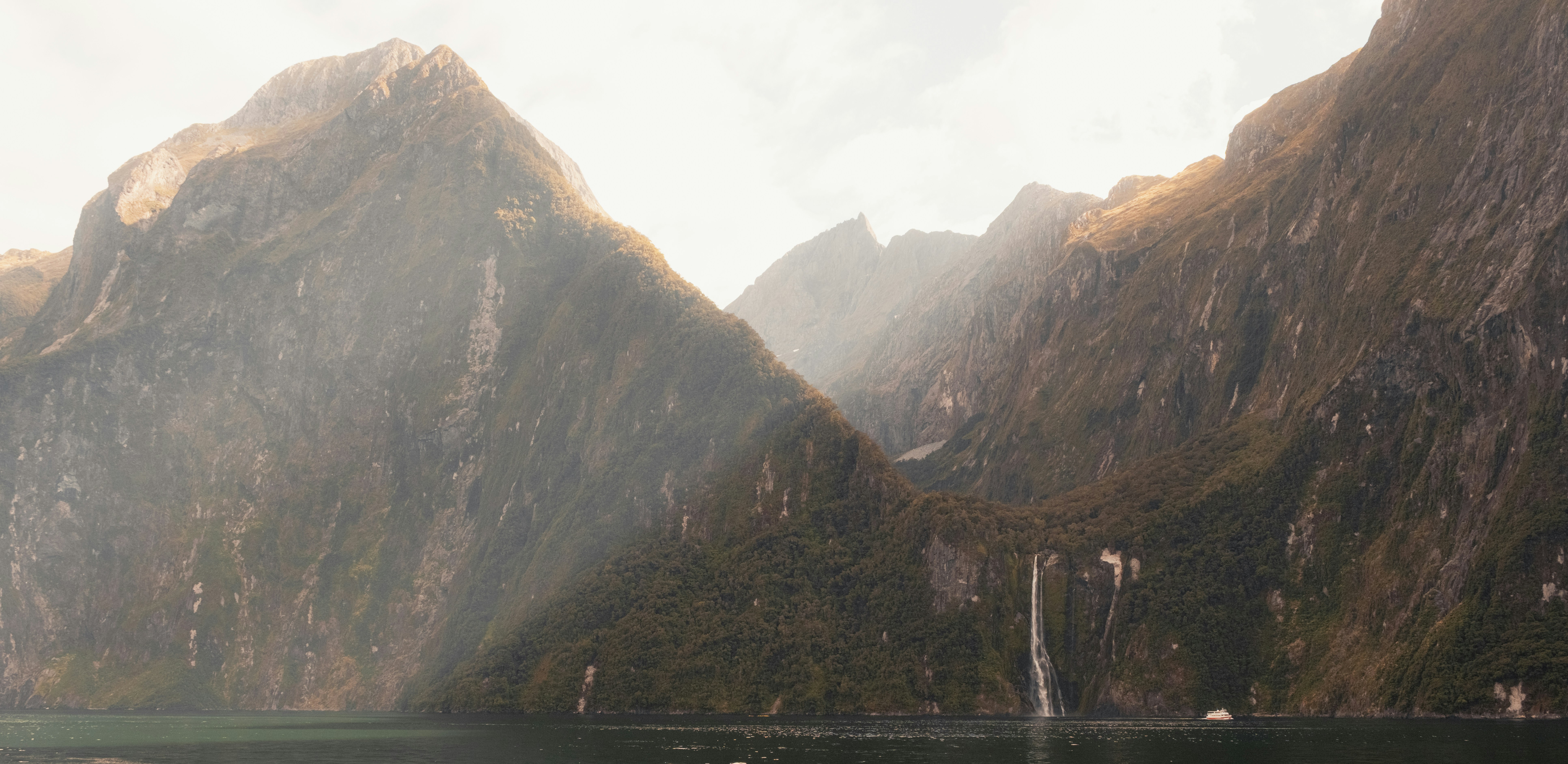 Misty Fjord Cliffs and a Distant Waterfall