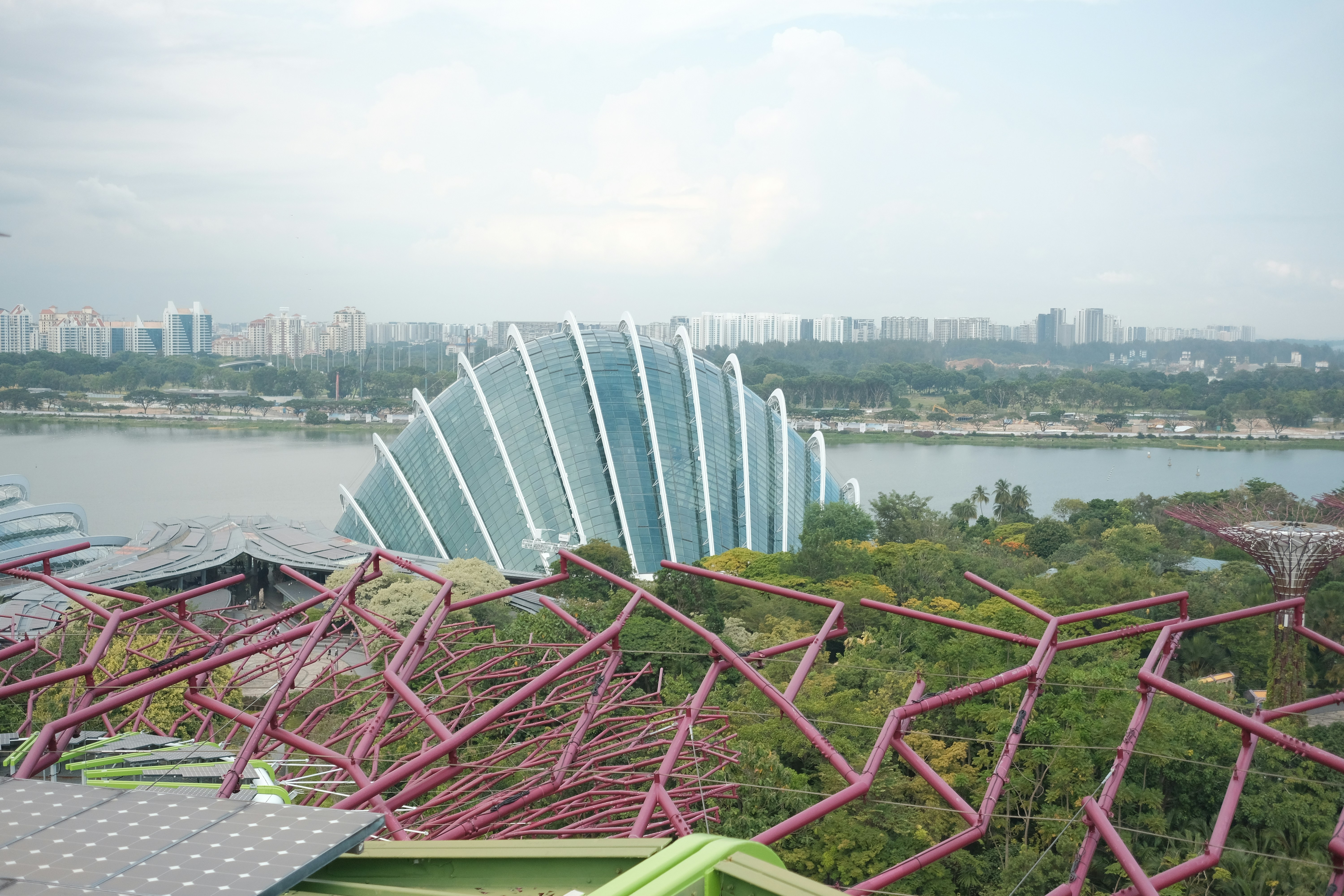 Architectural Bloom Over the River: The Shell and Lattice of Gardens by the Waterfront
