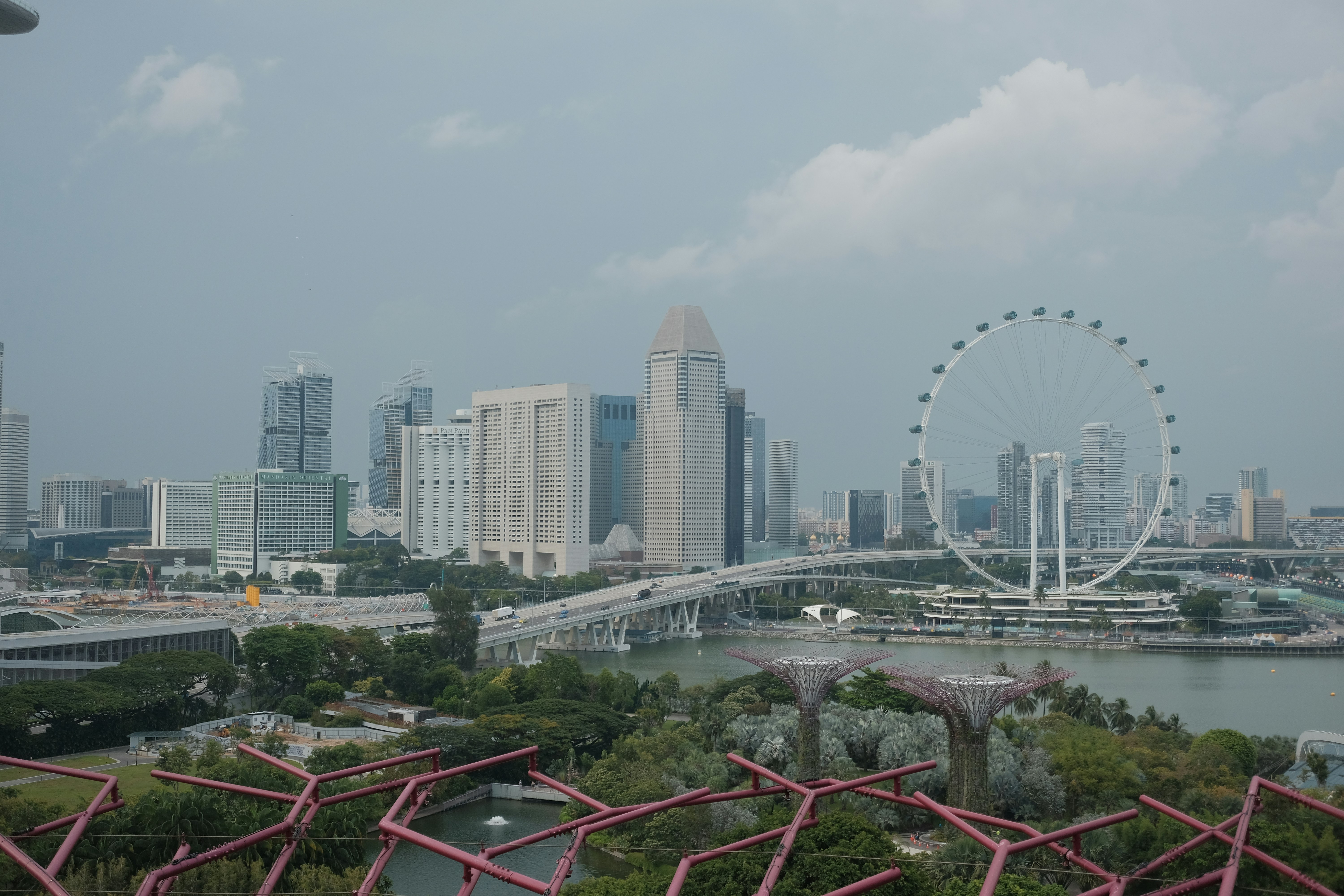Ferris Wheel Glint Over the Marina: A Panoramic Cityscape