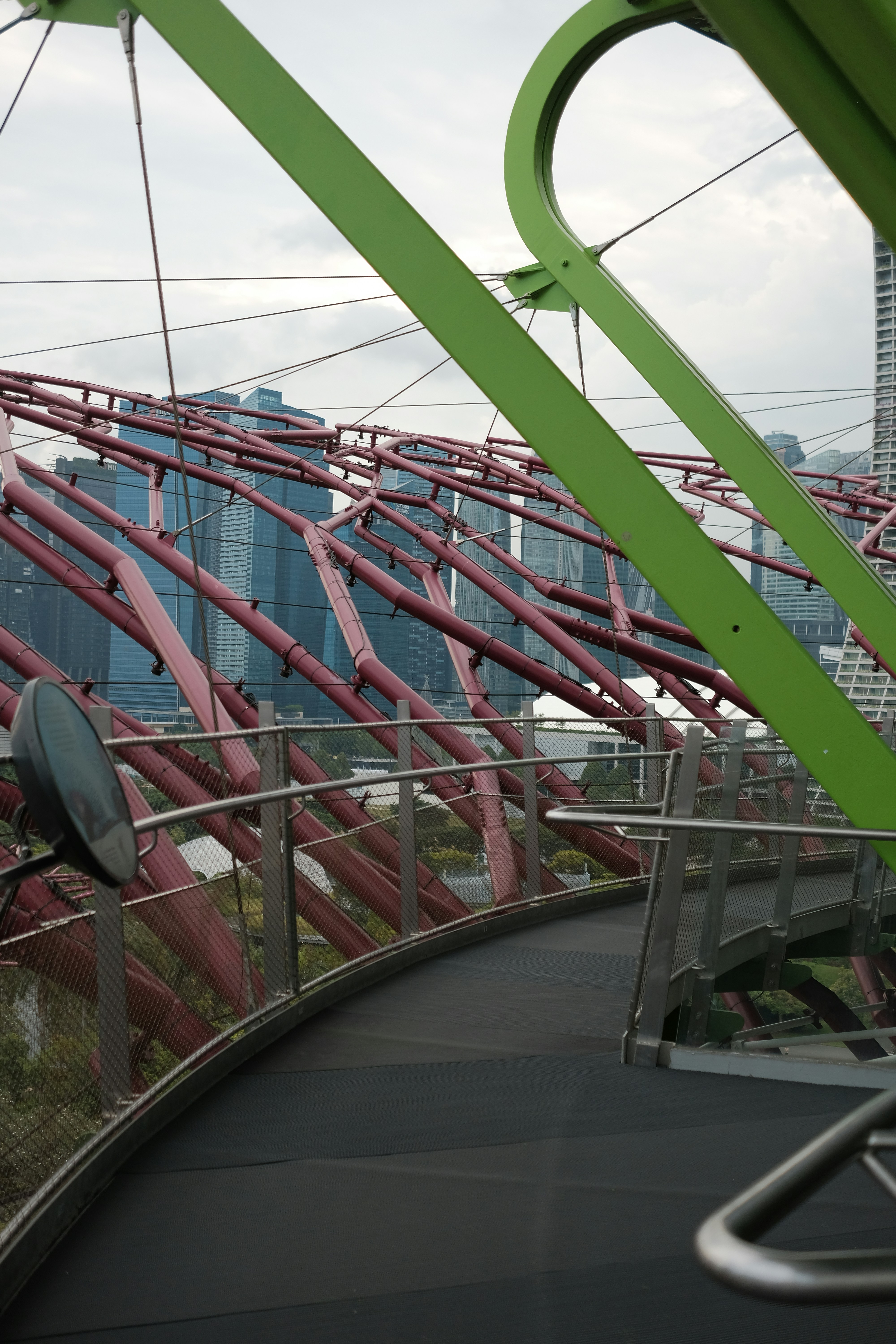 Green Arches Over a City Walkway