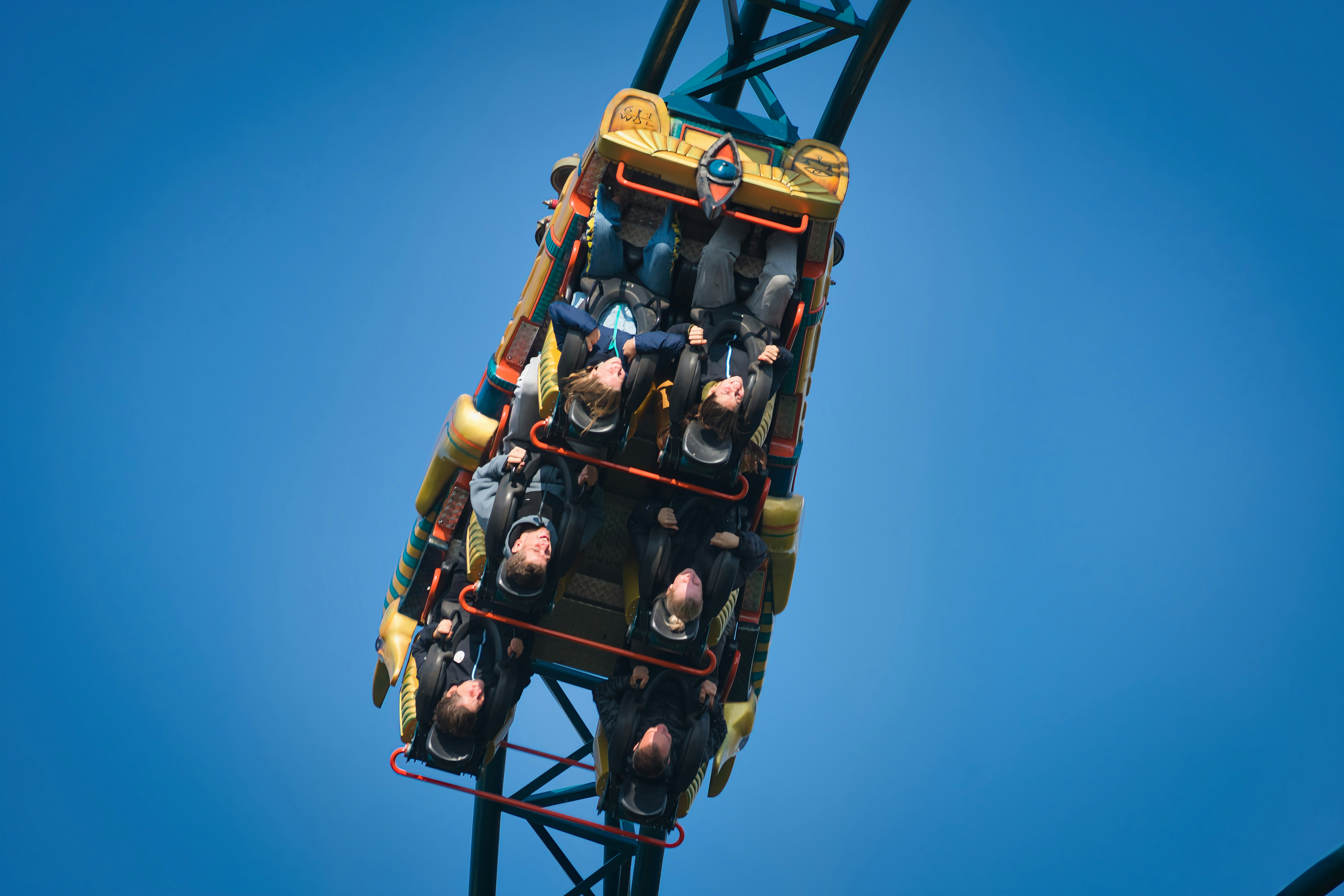 Descending Thrill: A Moment Inside the Loop of a Roller Coaster Train