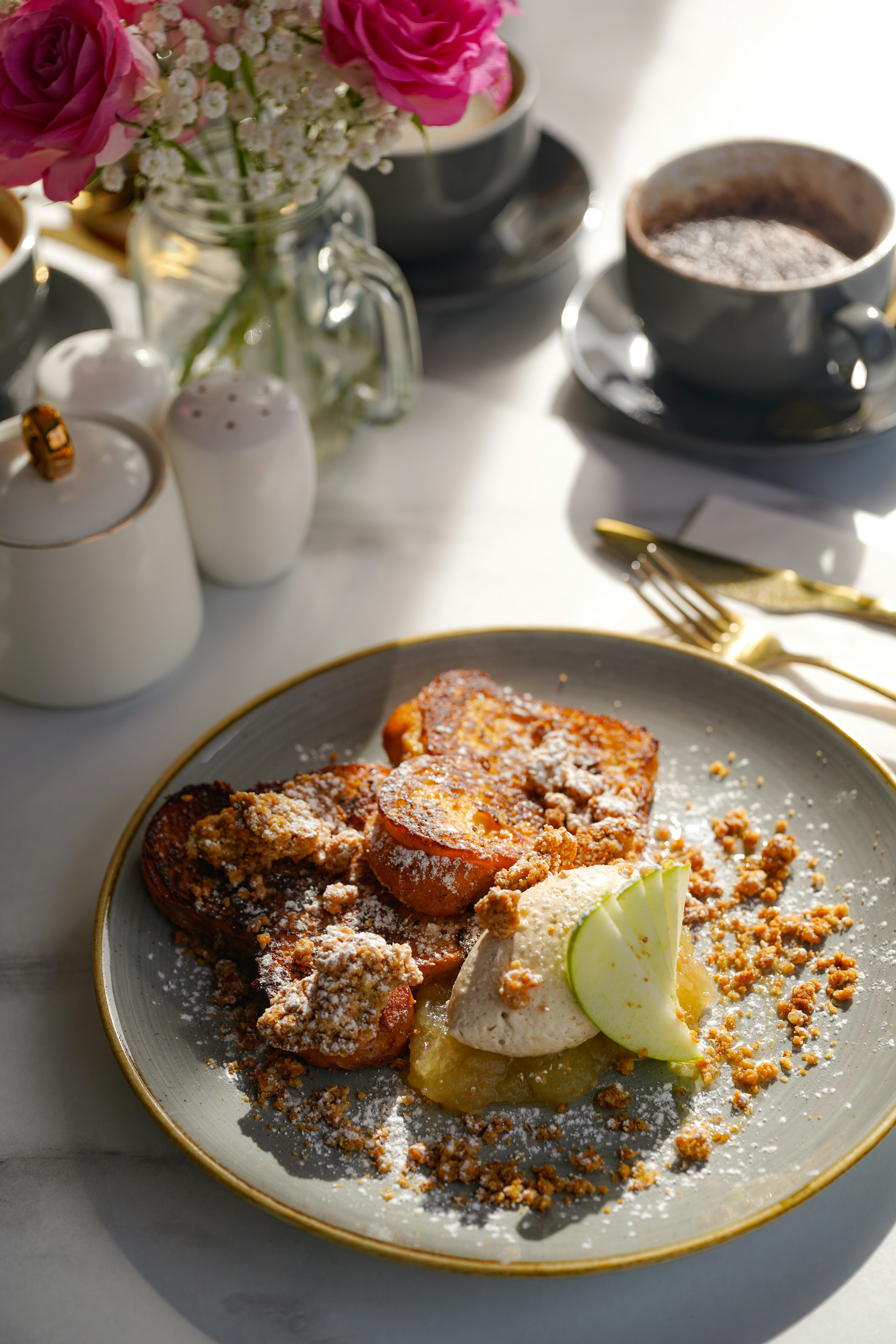 Golden French Toast with Pear Garnish on Marble Table