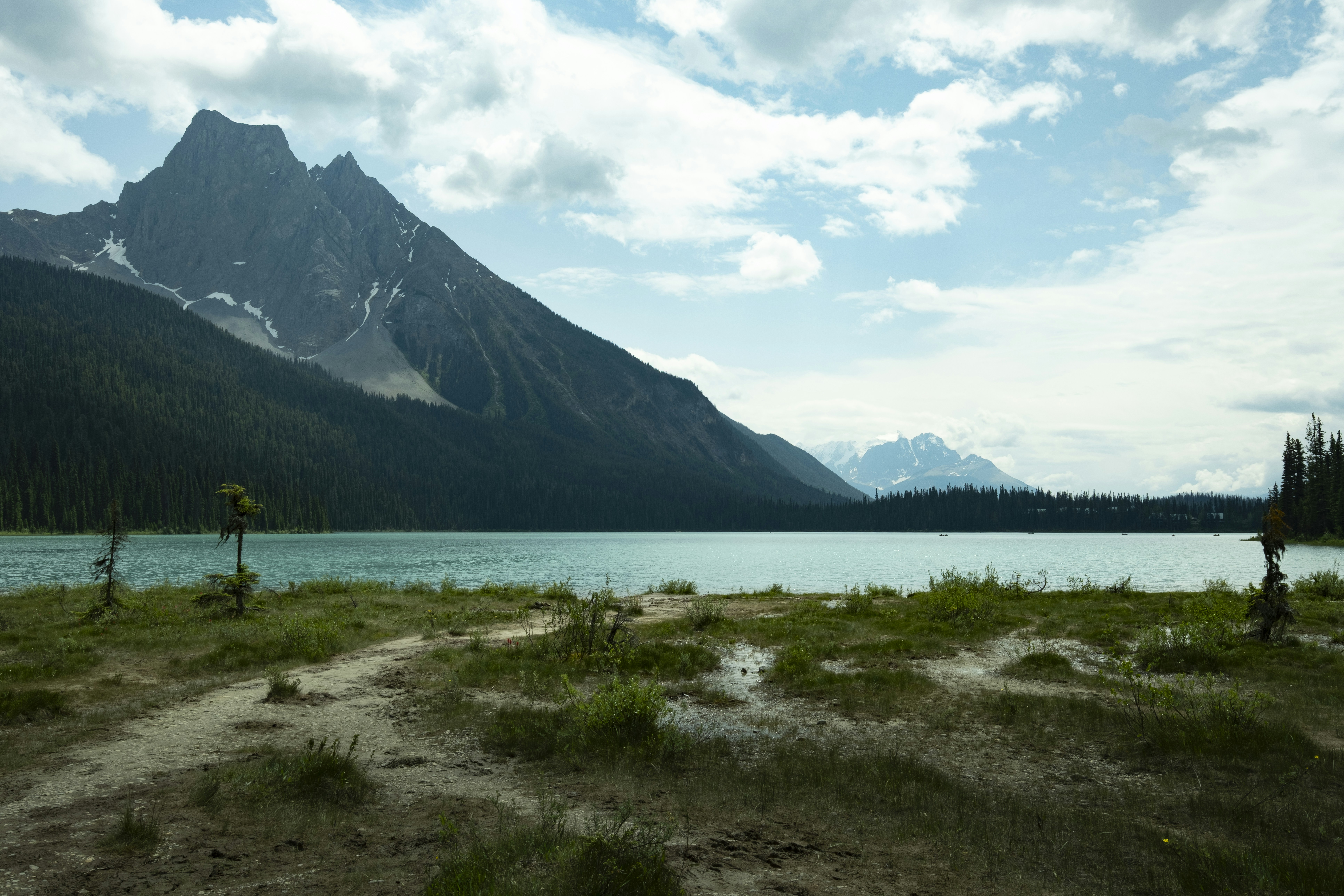 Azure Lake Vista Beneath Jagged Peaks