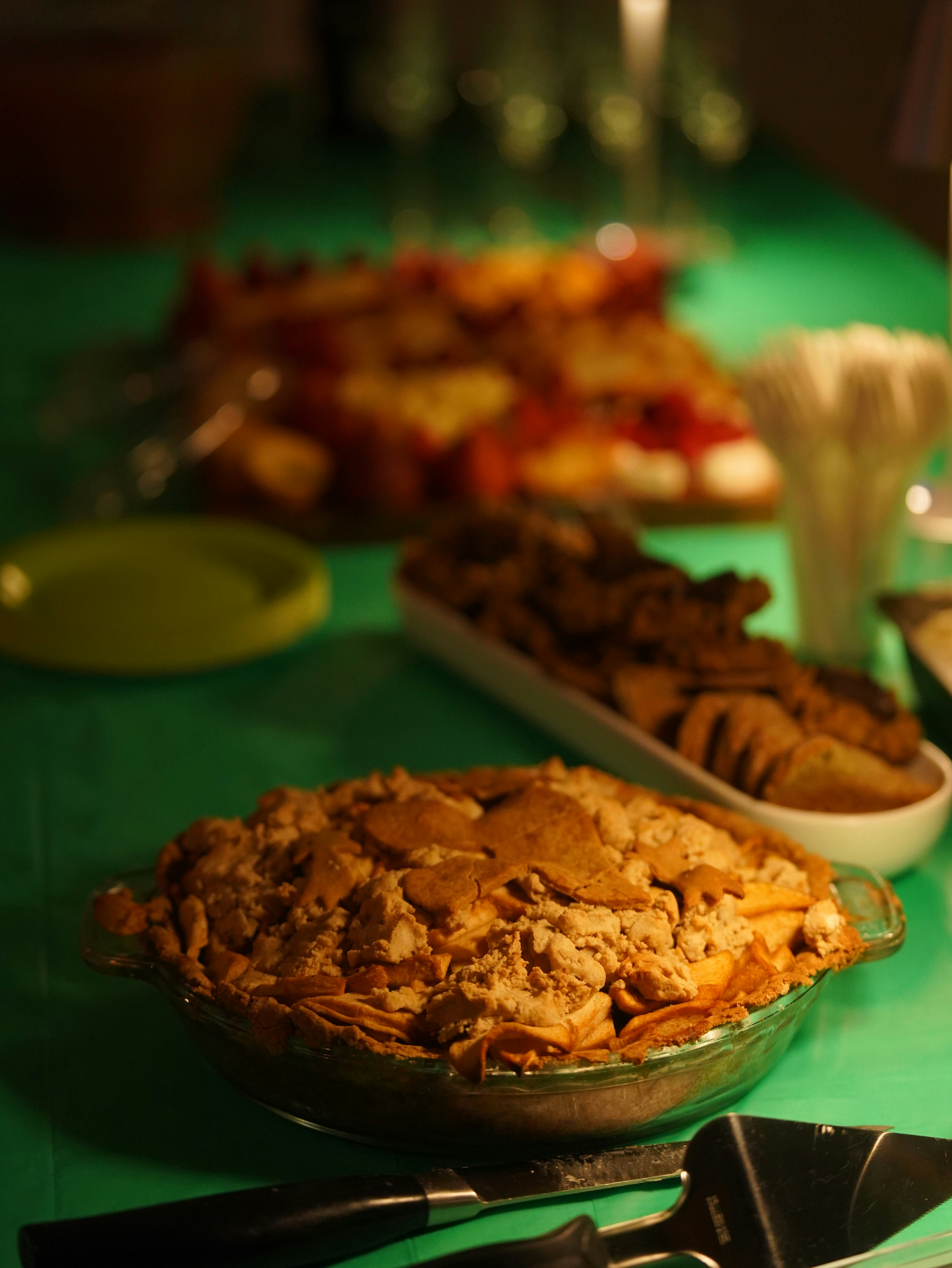 Golden Crumble Horizon: A Pie-Cribbled Spread at a Dinner Bar
