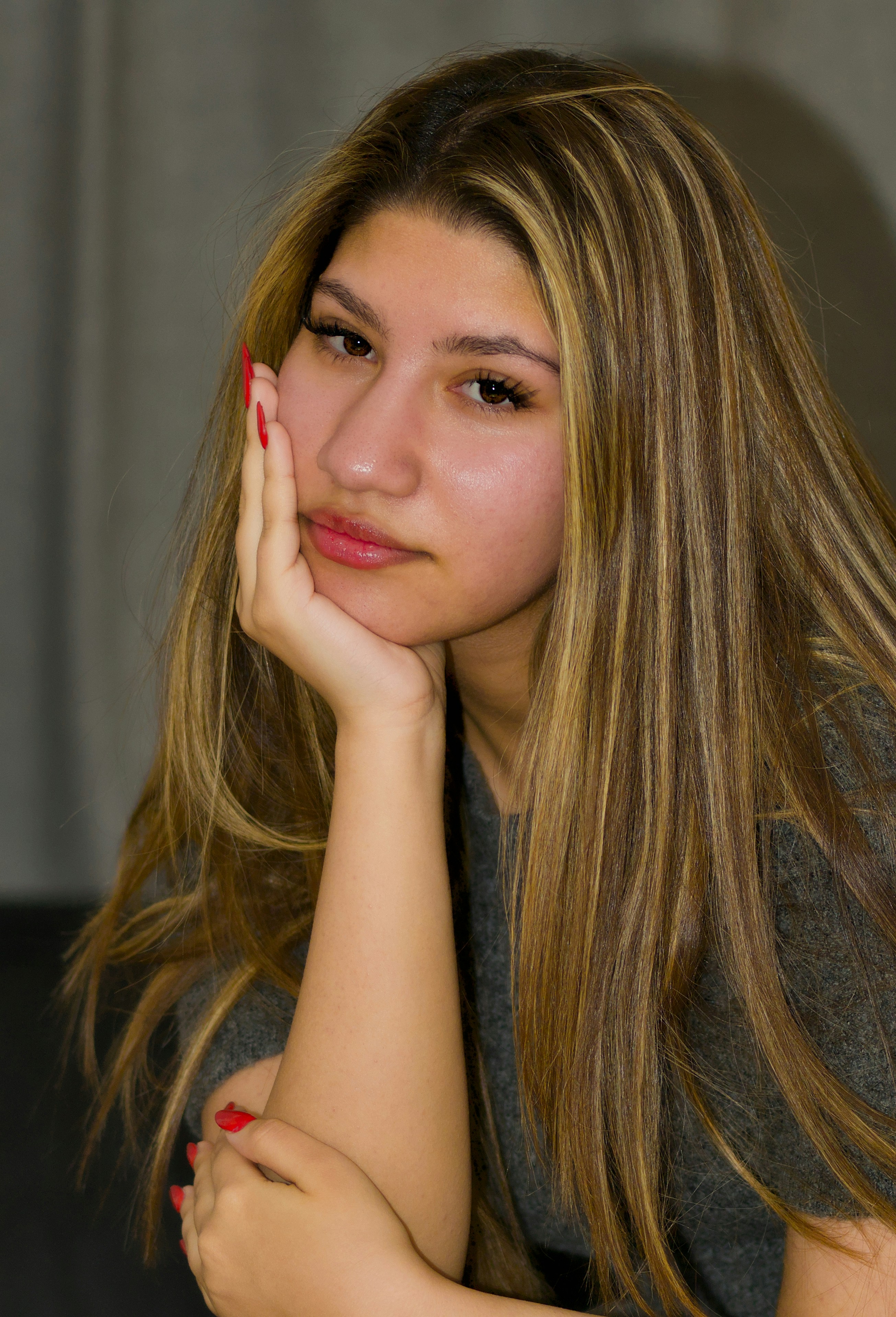 Soft Focus, Strong Gaze: A Quiet Moment with a Youthful Contemplation