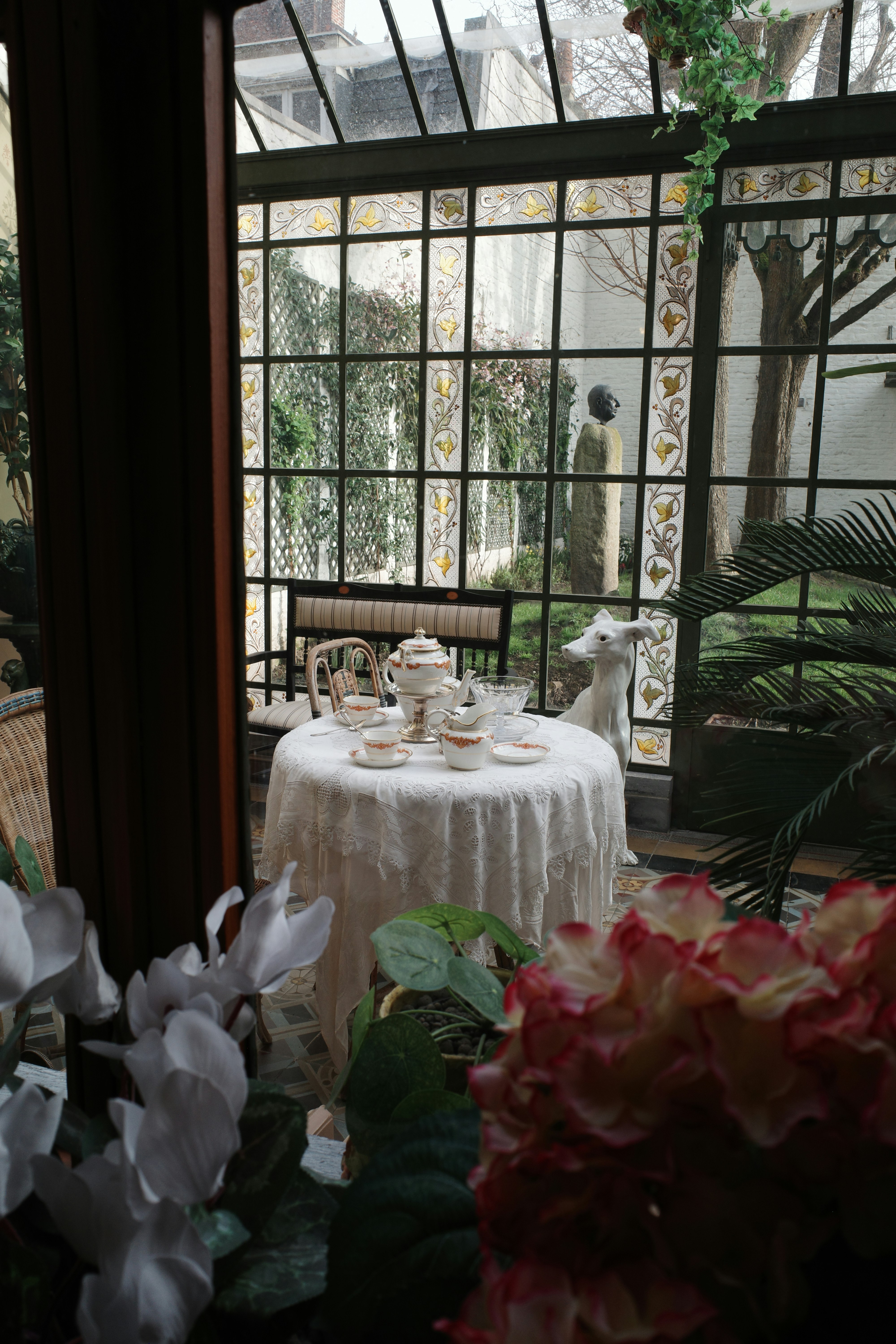 Tea for Two in a Glasshouse Conservatory