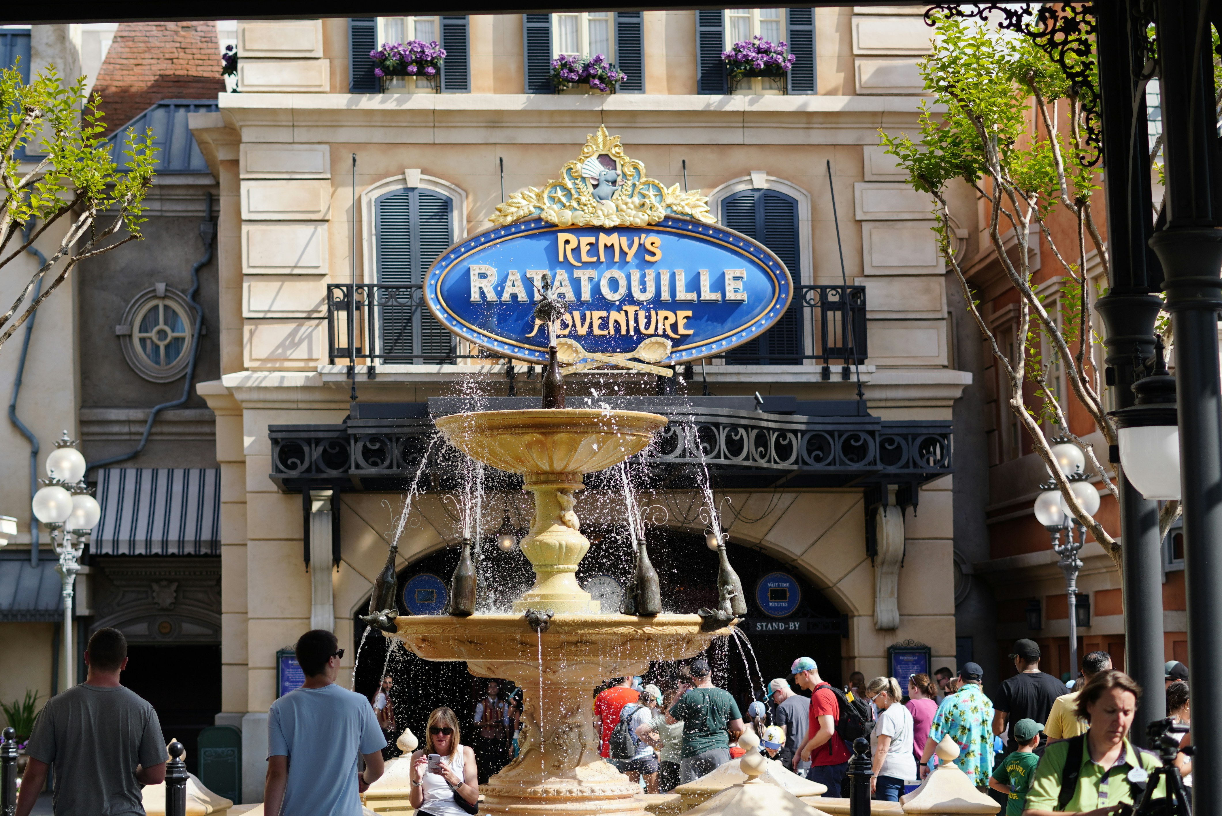 Remy’s Ratatouille Adventure Fountain Blooming Under Parisian Facade