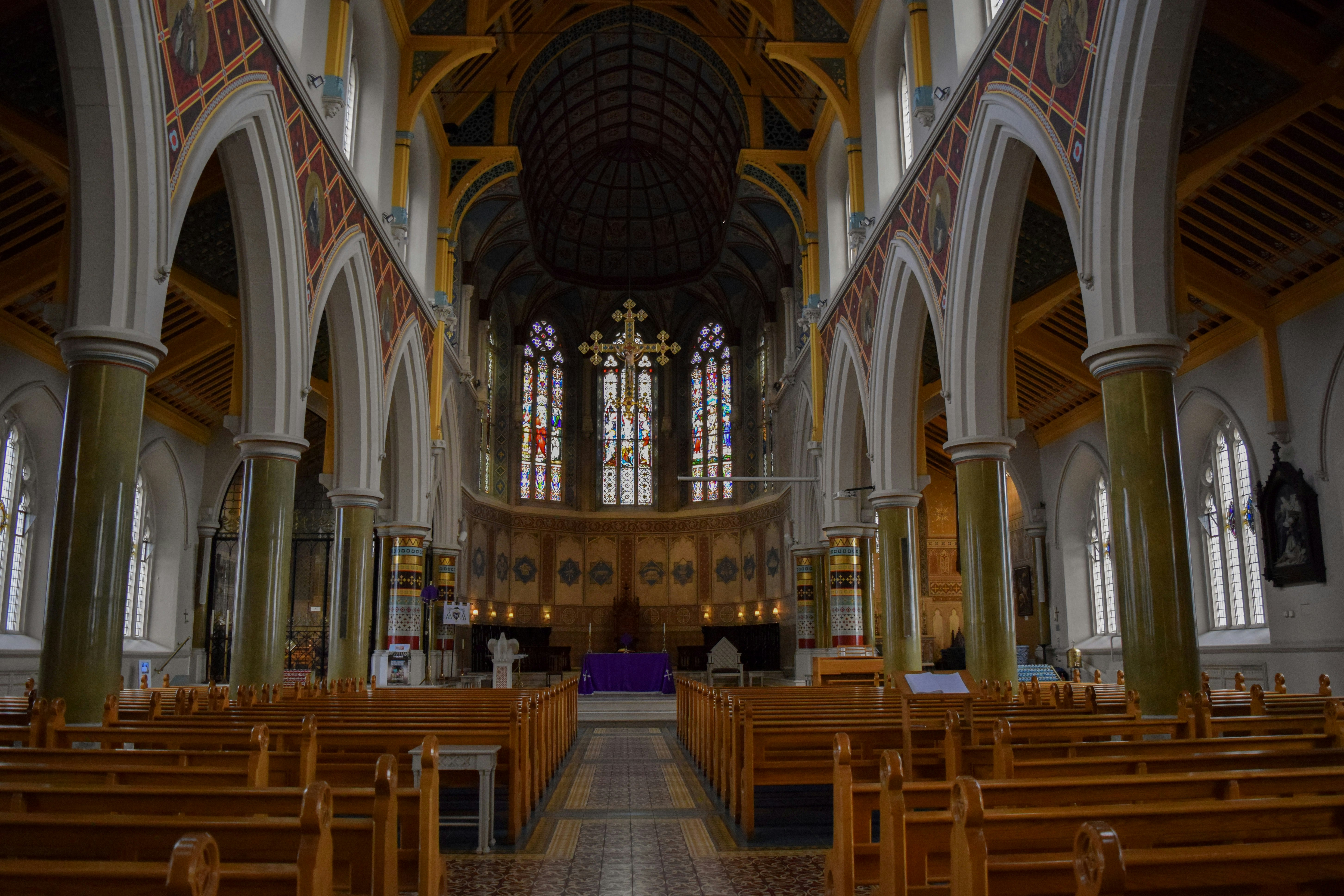 Aisle Toward the Altars: Sacred Light Framing the Nave