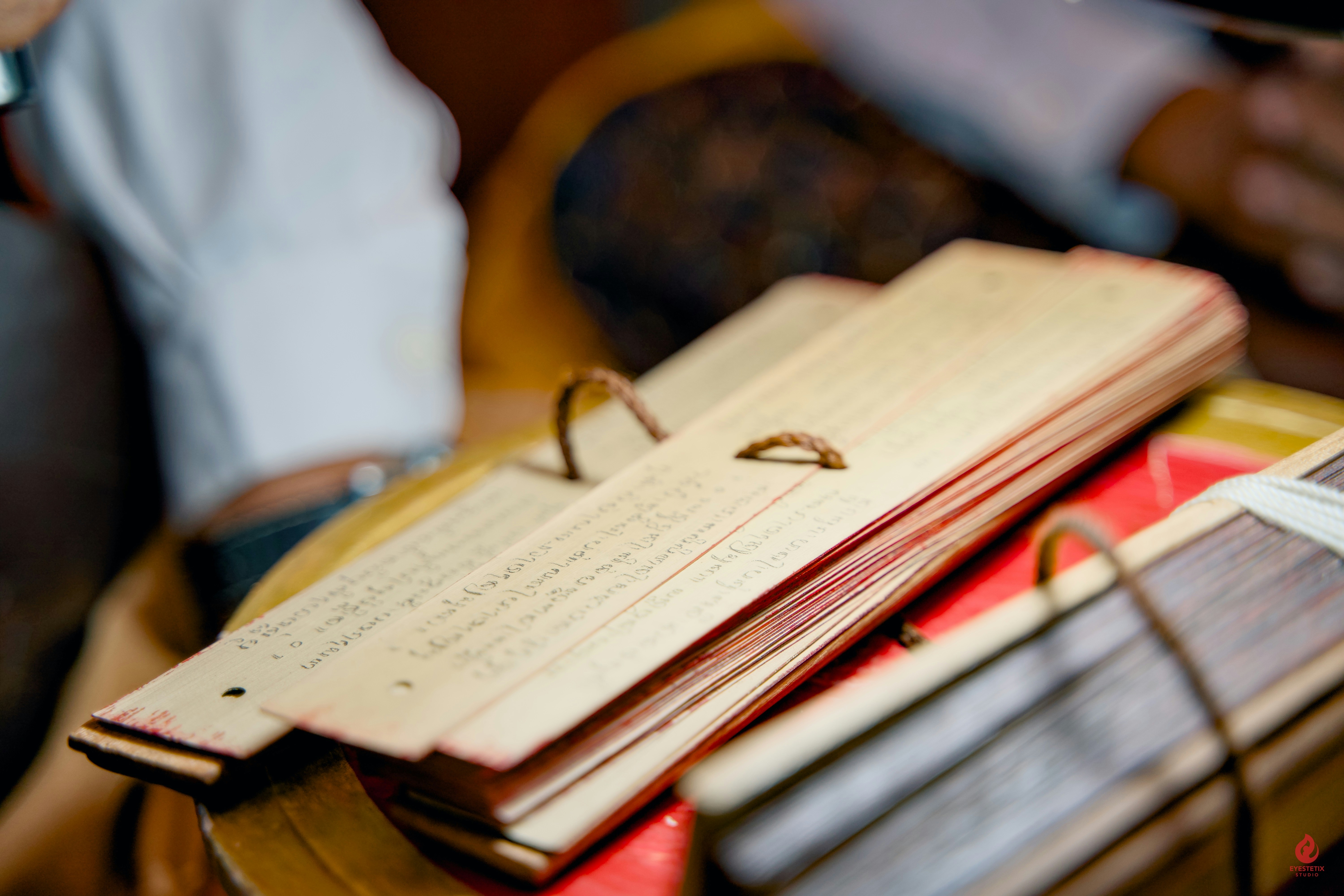 Open Notebook Threads: Handwritten Pages on a Wooden Table