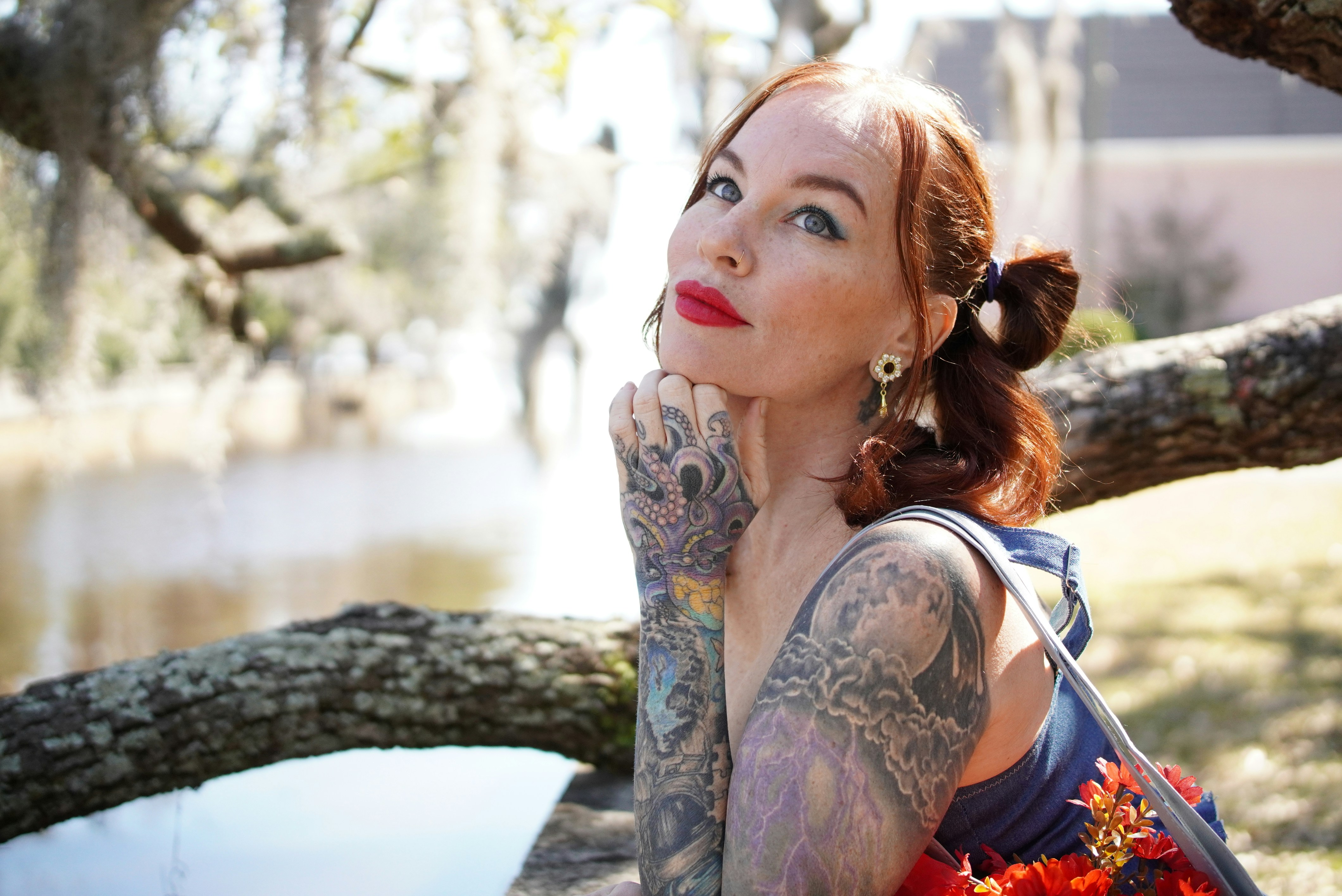 Red Lip, Inked Eyes: Portrait Beneath the Branches