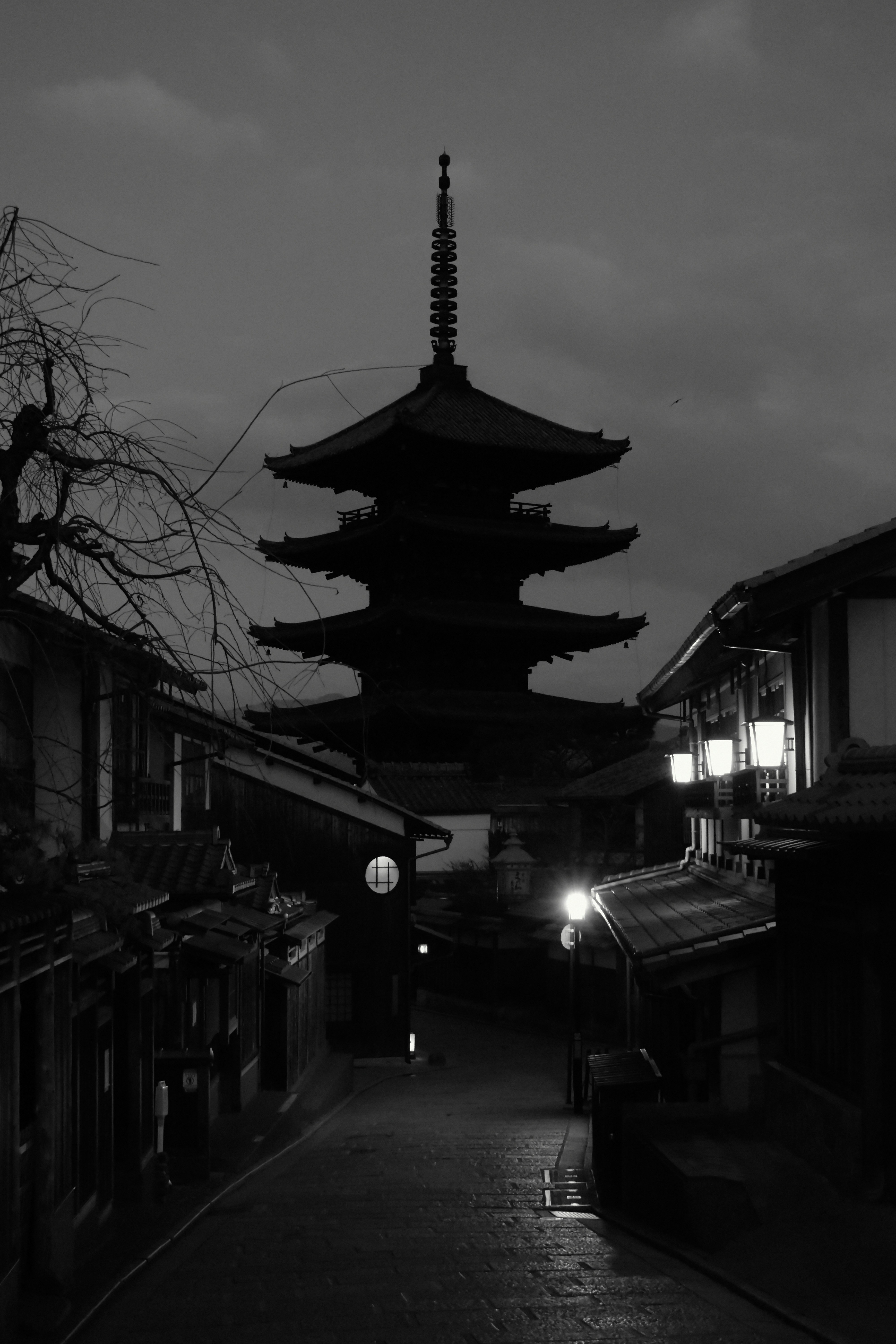 Night Gorge: A Silent Pagoda Watches Over a Lantern-lit Alley