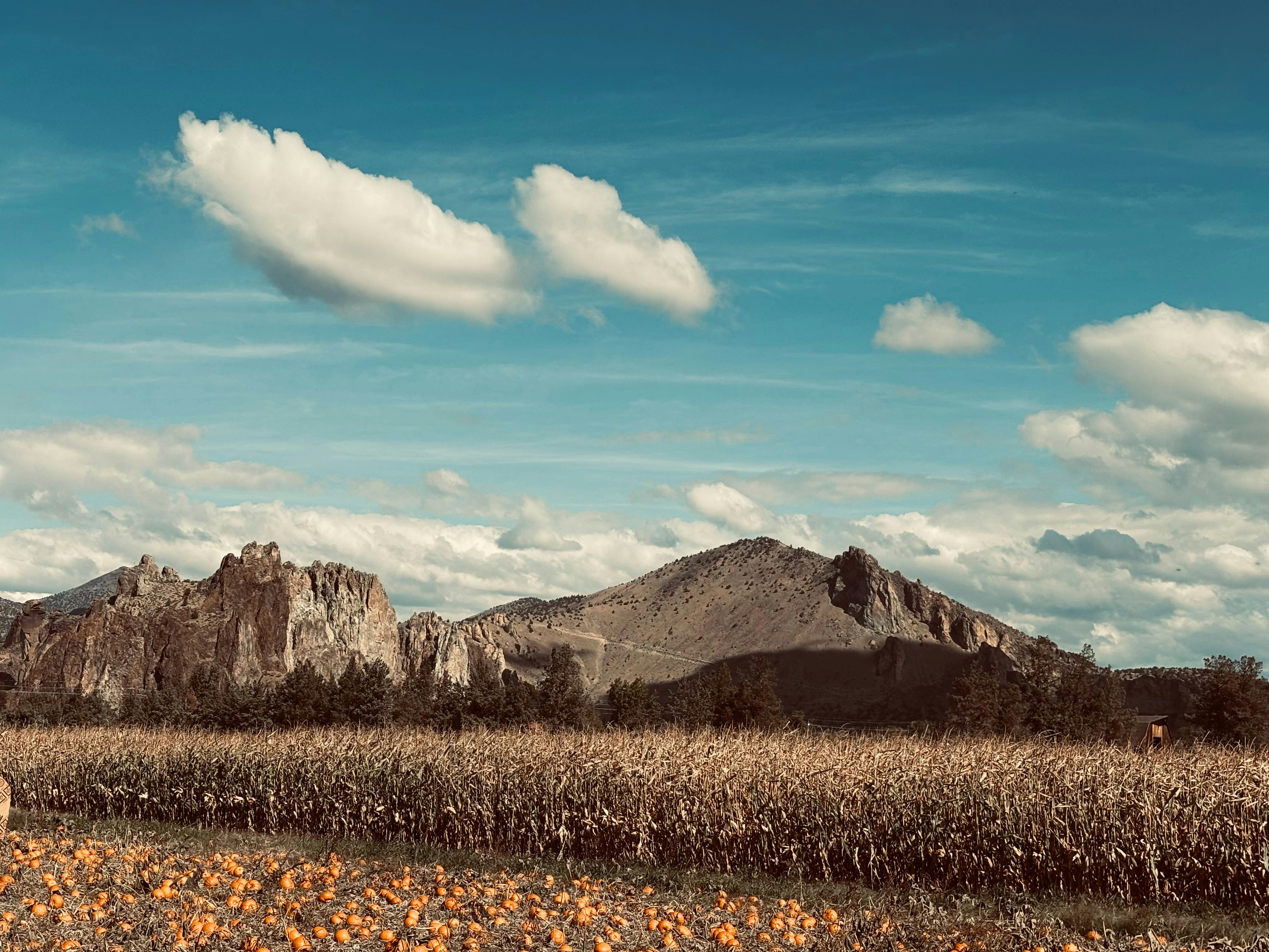 Distant Cliffs Under Wide Sky
