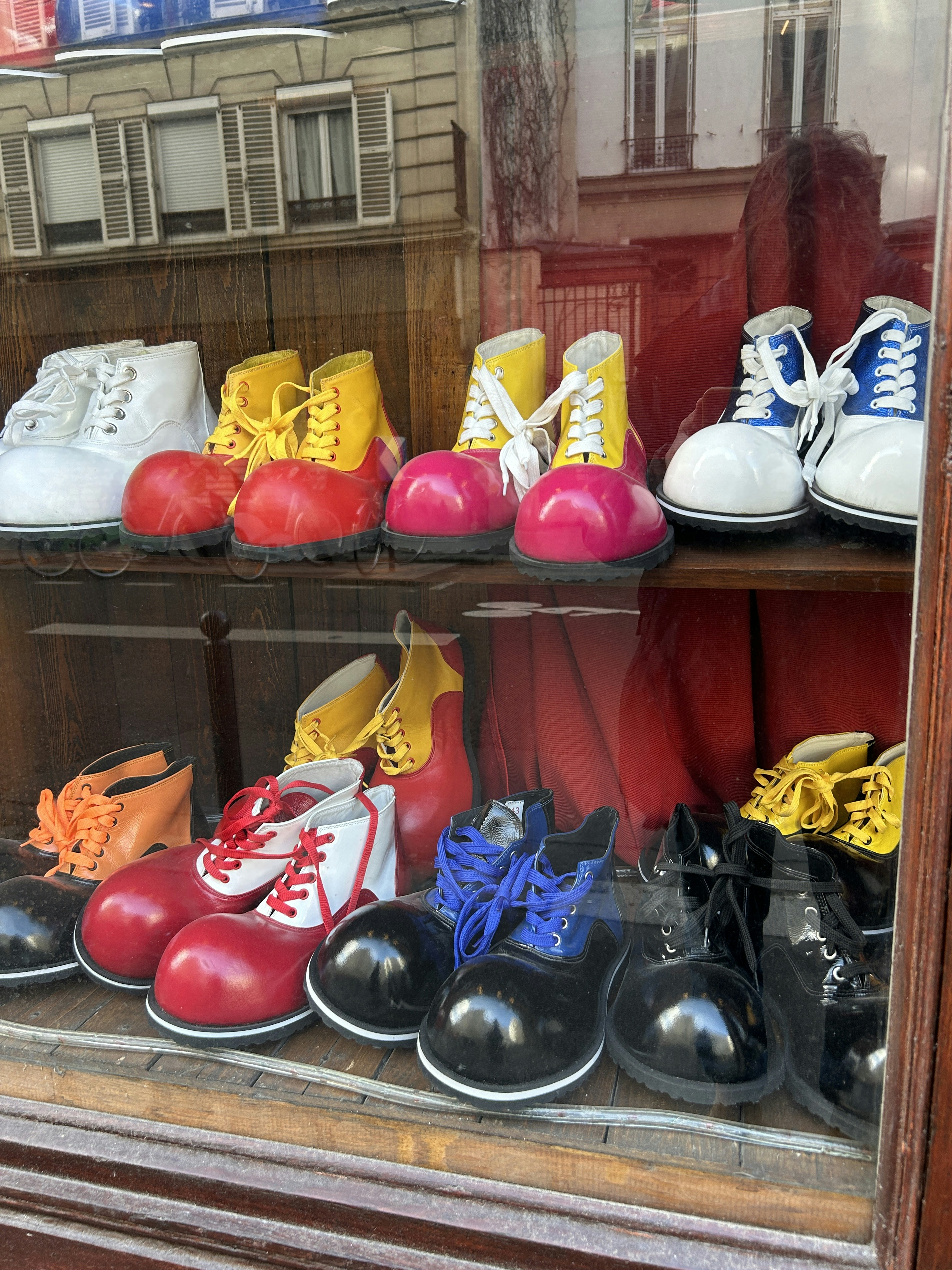 Colorful Shoes in a Storefront Window: A Closer Look at Factory-Pressed Hues