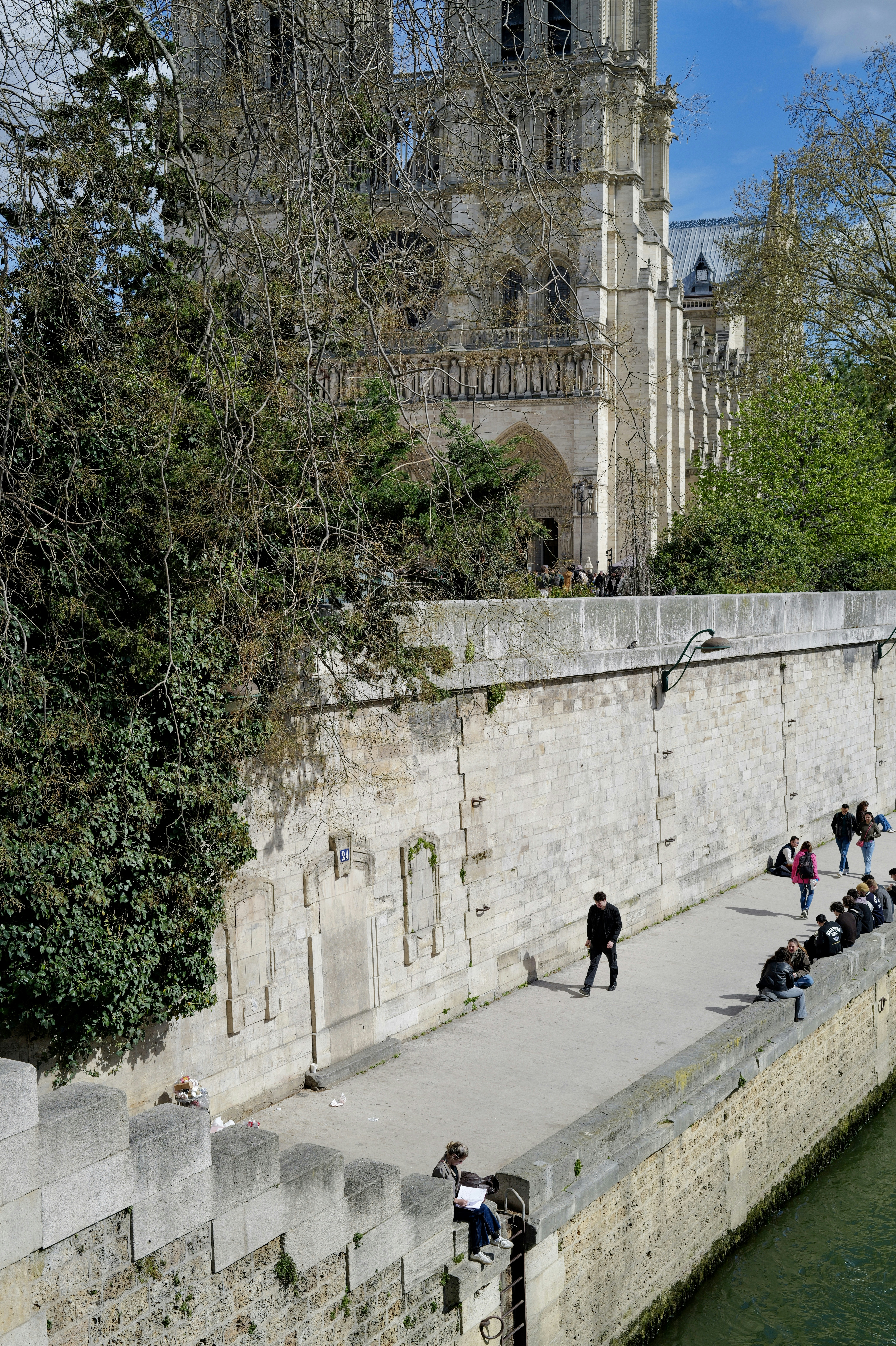Riverside Walk Along a Historic Wall