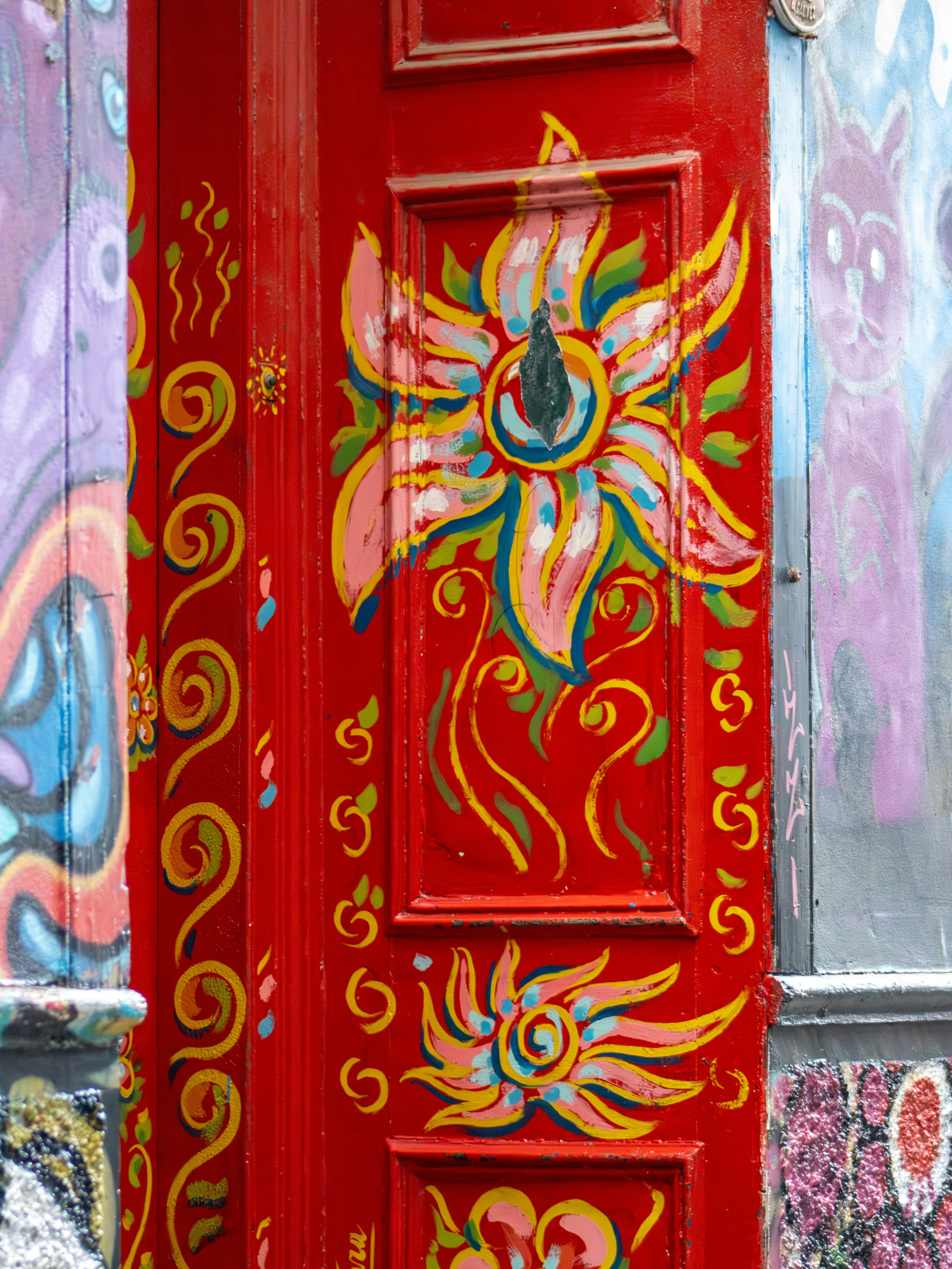 Emerald Petals on a Crimson Door