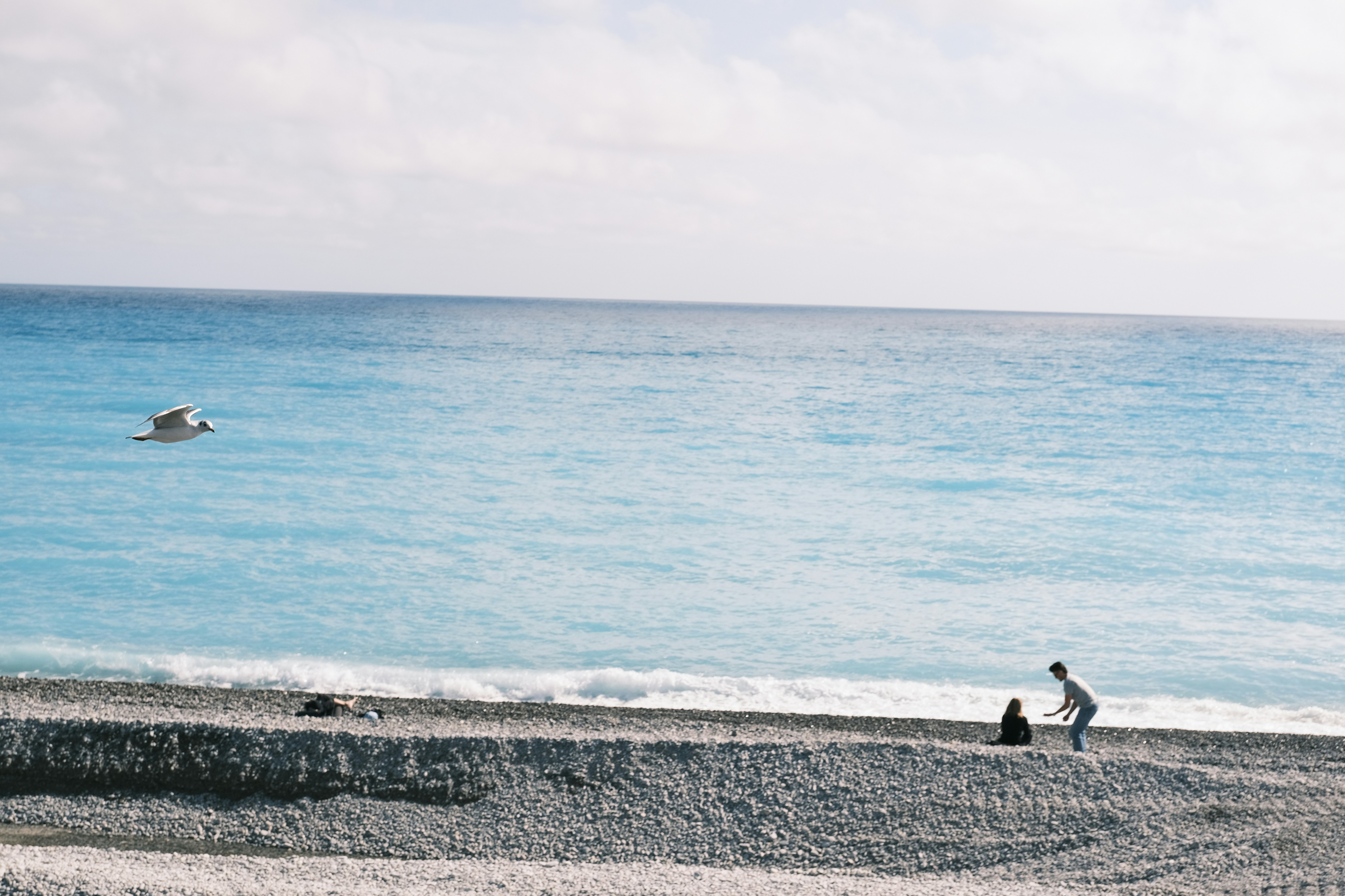 Seaside Quiet: A Moment on the Pebble Bar