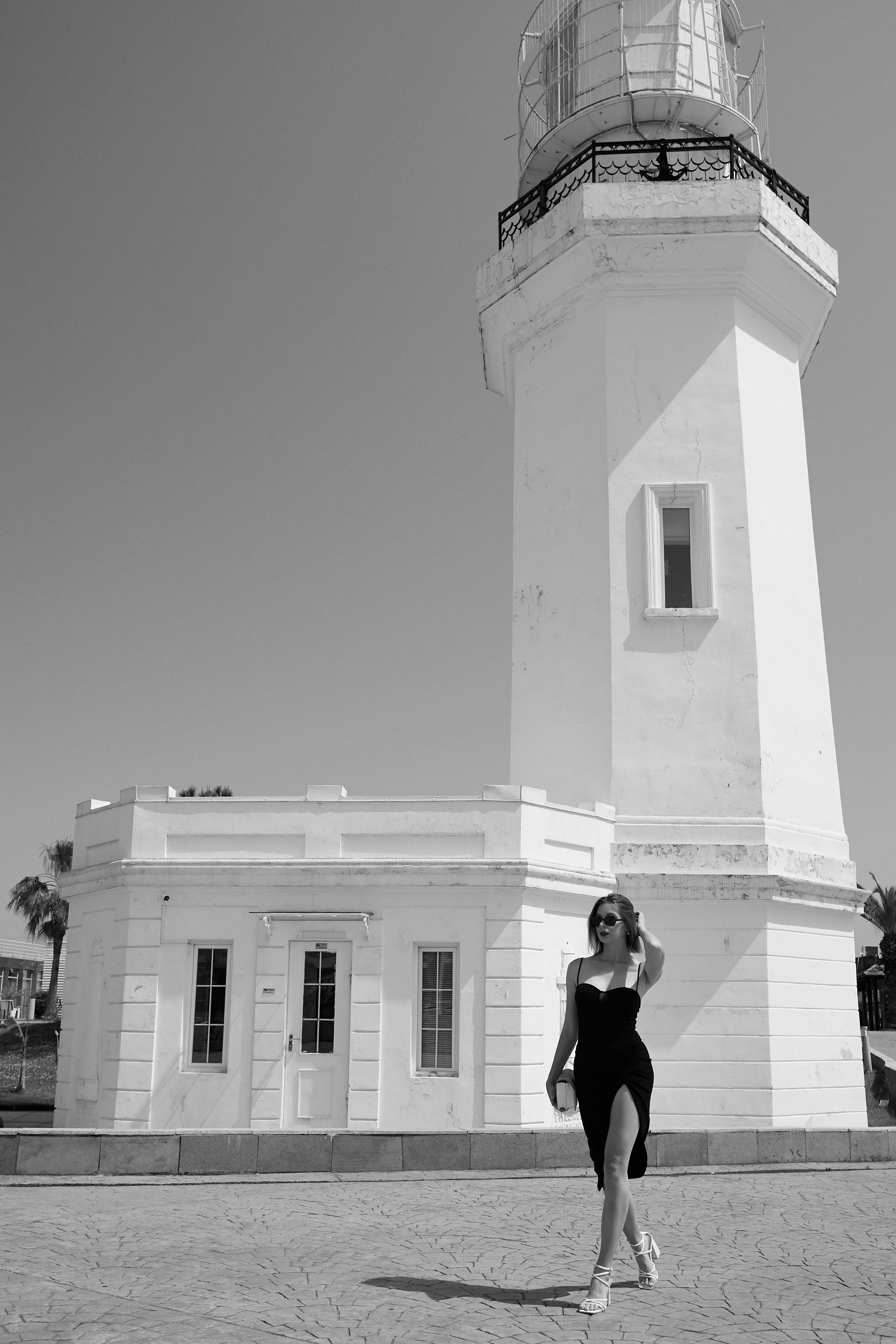Lighthouse Silhouette: A Fashion Moment by the Pier