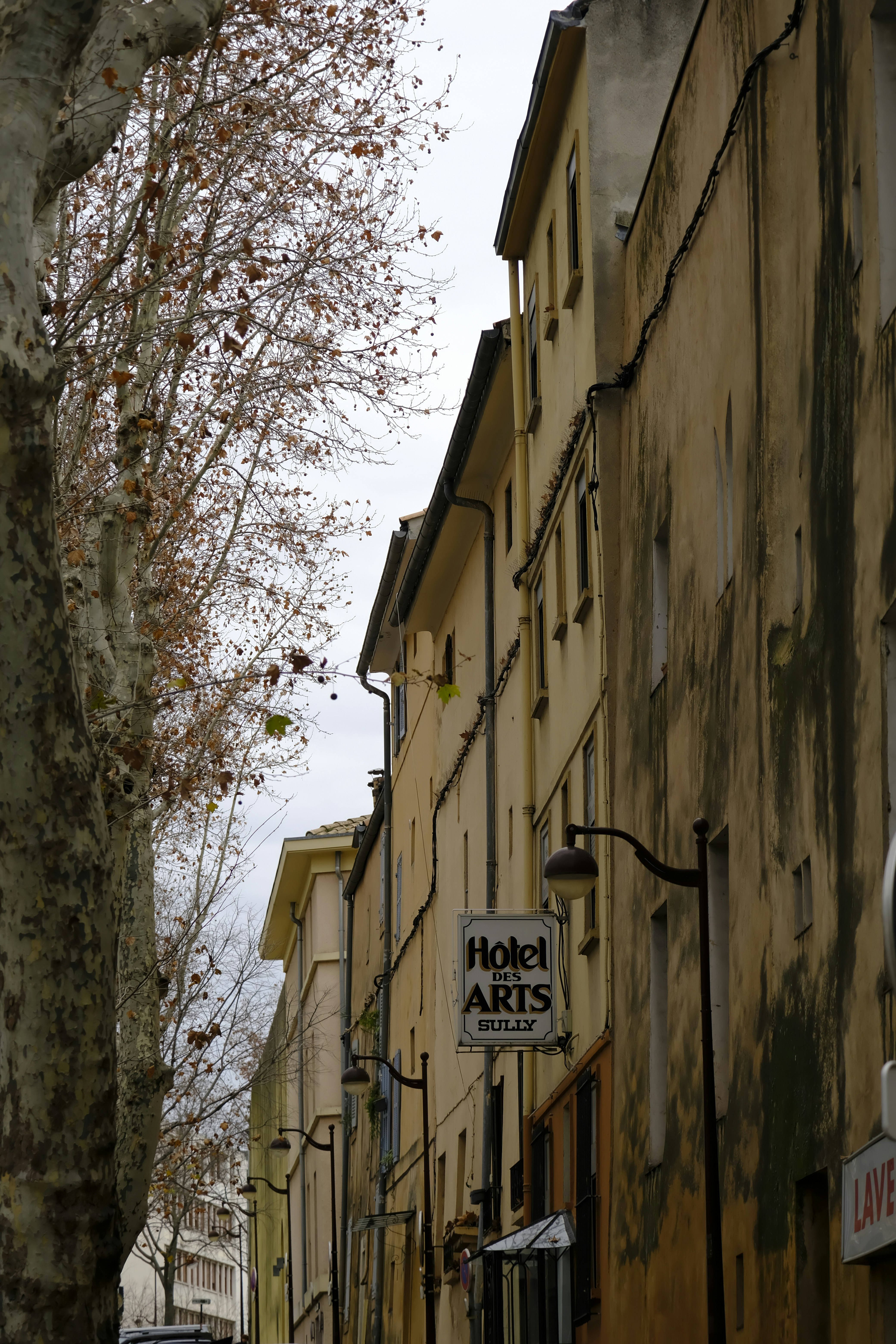 Old Town Facade: A Narrow Street Between Weathered Walls