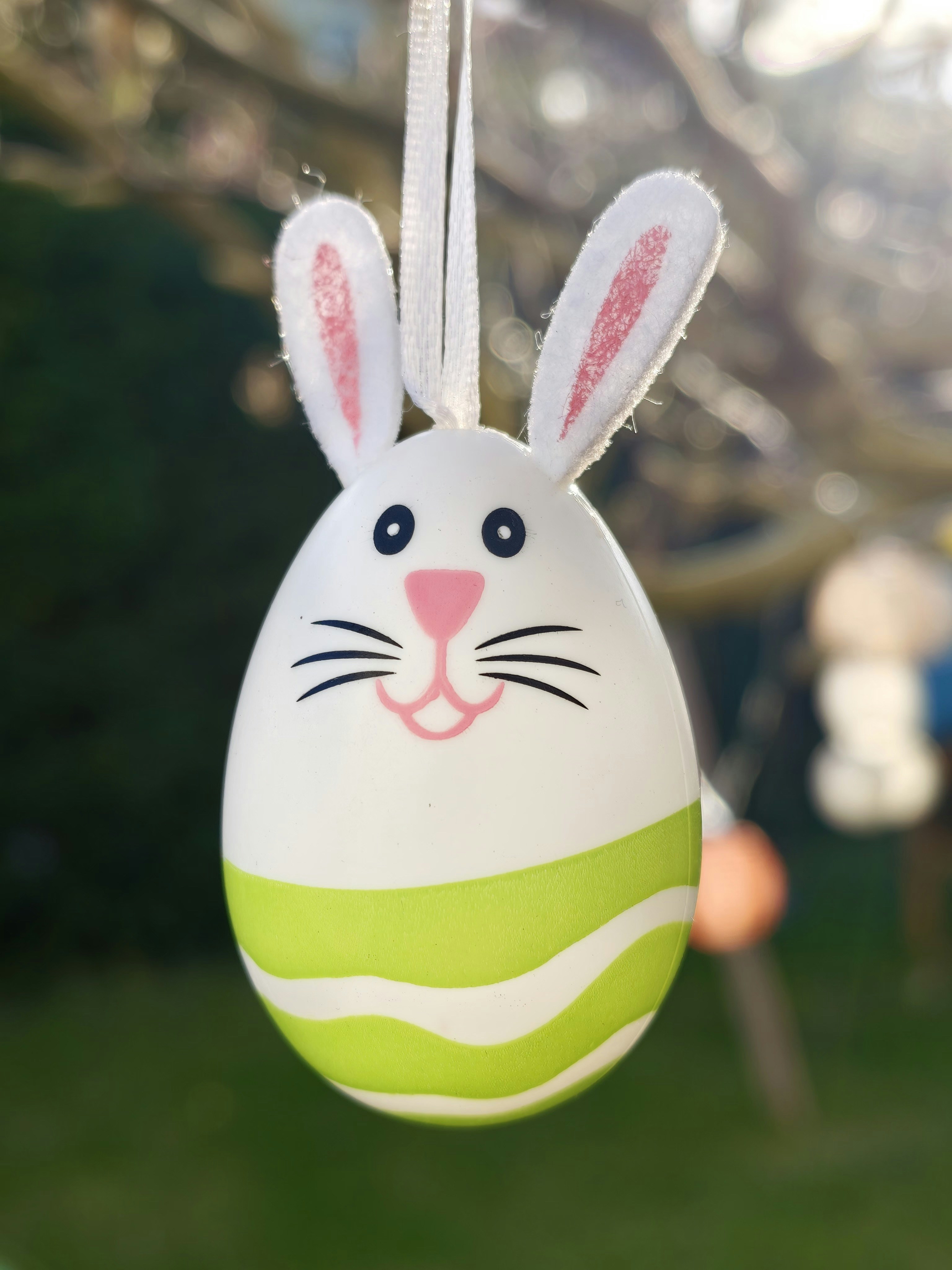 Hanging Bunny Ornament: A Playful Easter Bunny Pendant in Soft Backlight